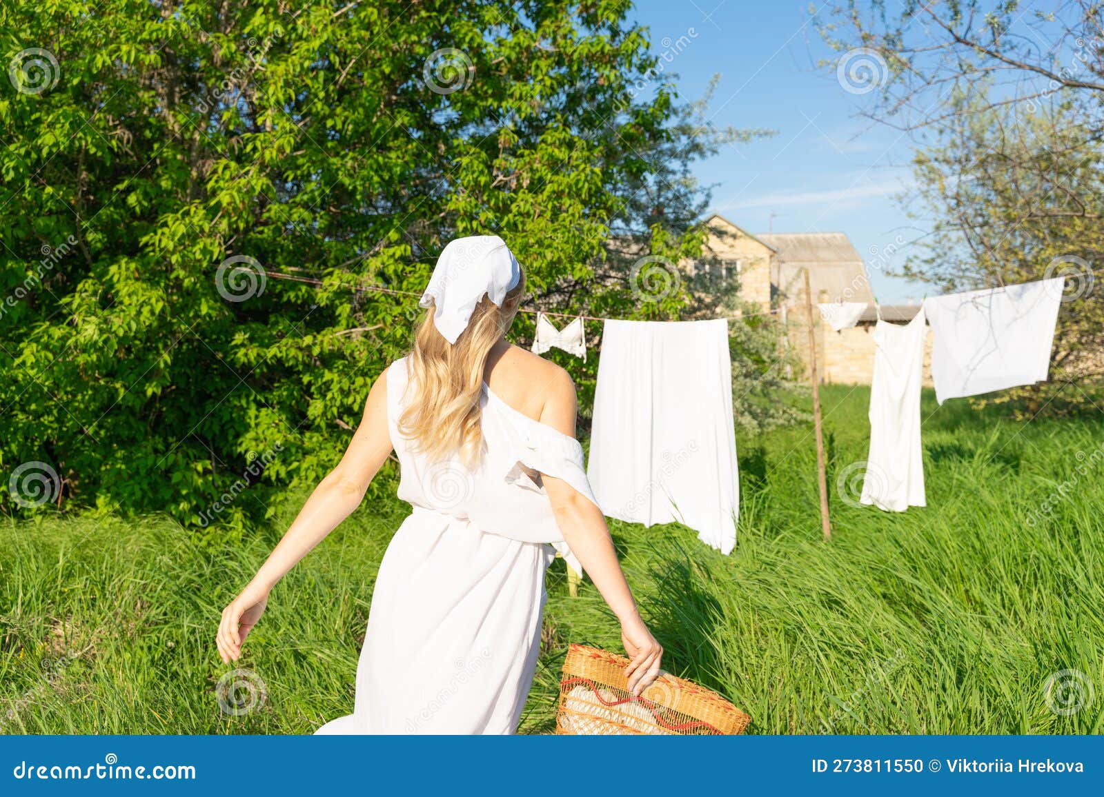 Young Woman Hanging Laundry Outdoors Beautiful Girl Working In
