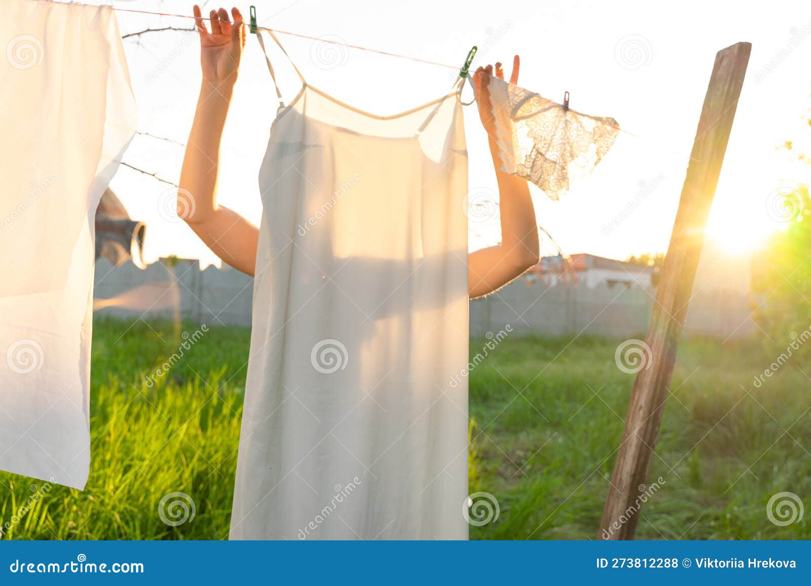 Young Woman Hanging Laundry Outdoors Beautiful Girl Working In