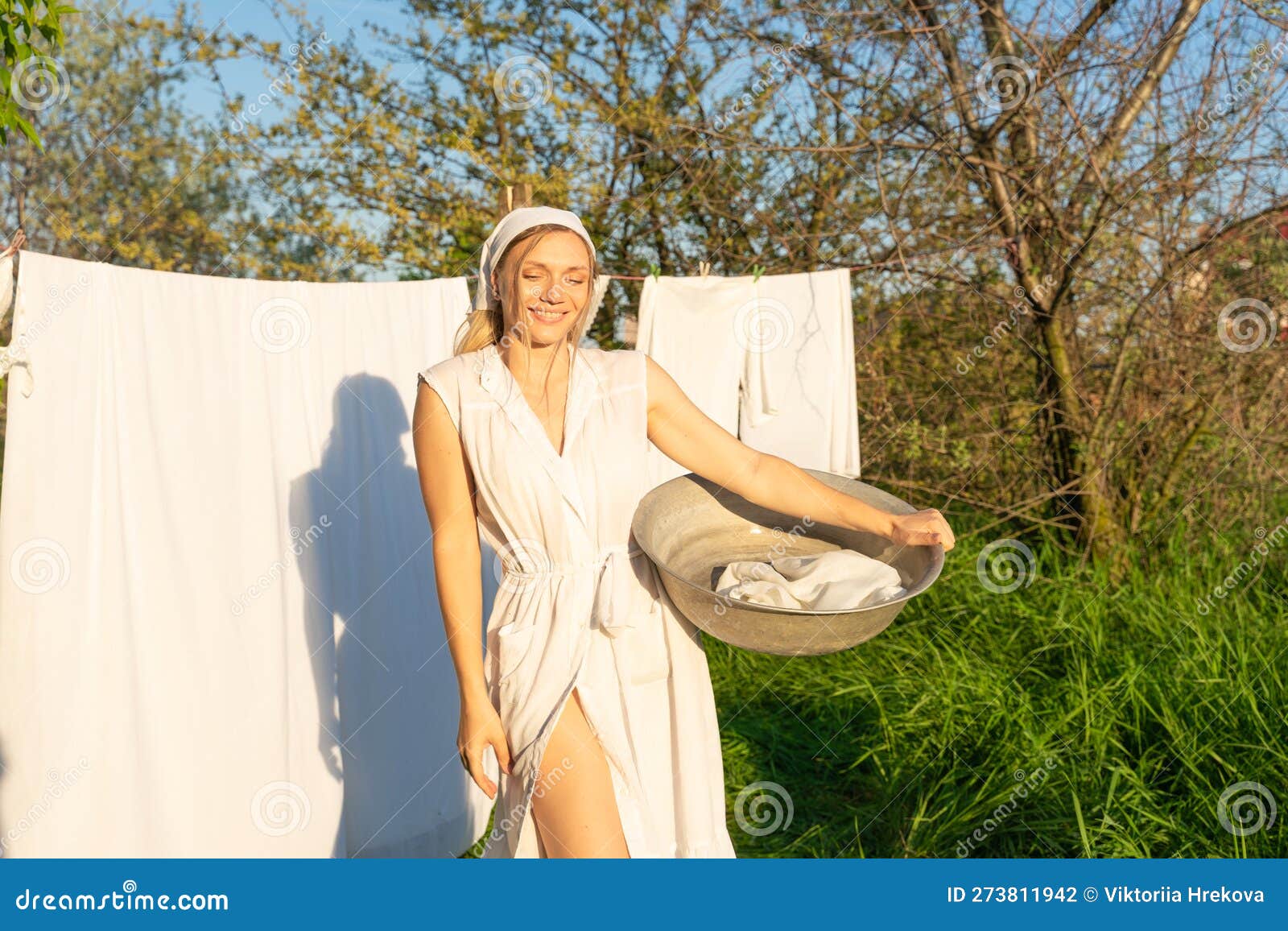 Young Woman Hanging Laundry Outdoors Beautiful Girl Working In