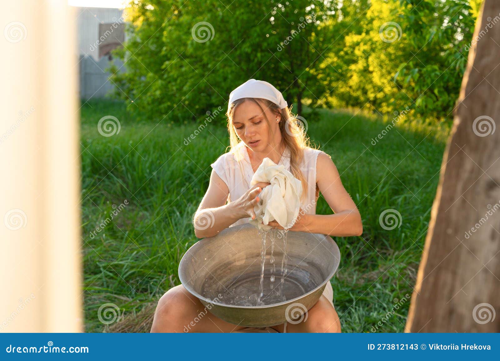Young Woman Hanging Laundry Outdoors Beautiful Girl Working In