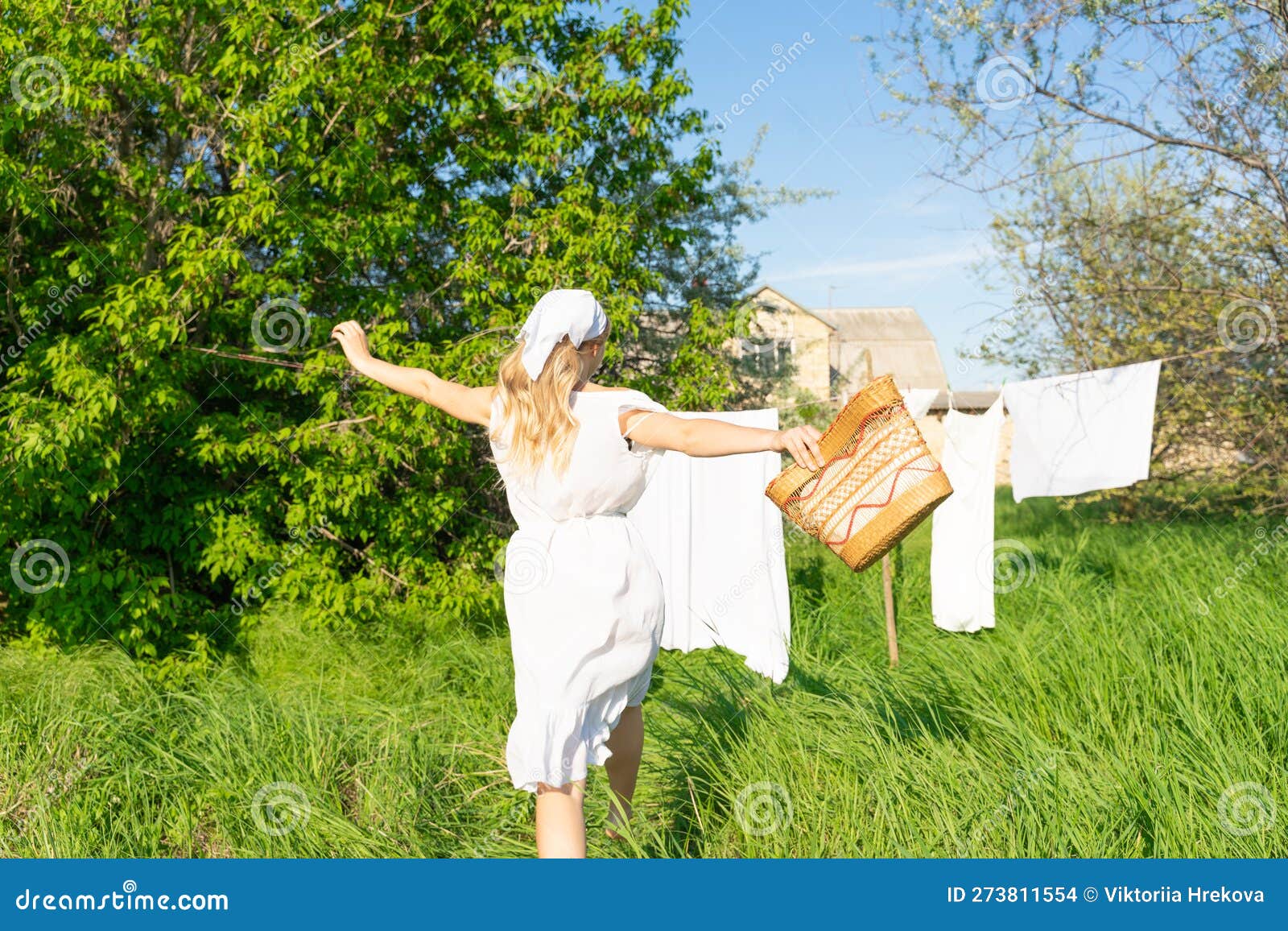 Young Woman Hanging Laundry Outdoors Beautiful Girl Working In