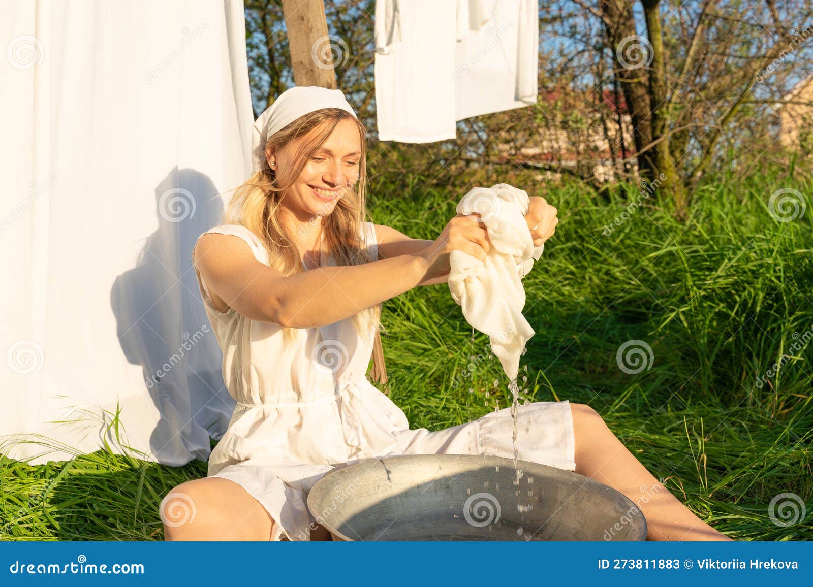 Young Woman Hanging Laundry Outdoors Beautiful Girl Working In