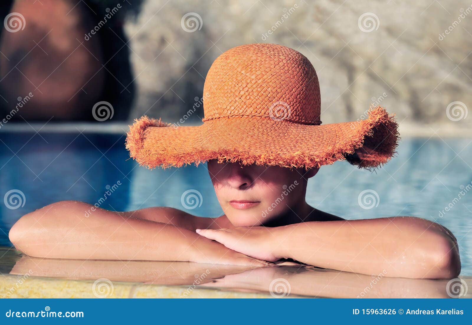 Young Woman in Hat Resting by the Side of Pool Stock Photo - Image of ...