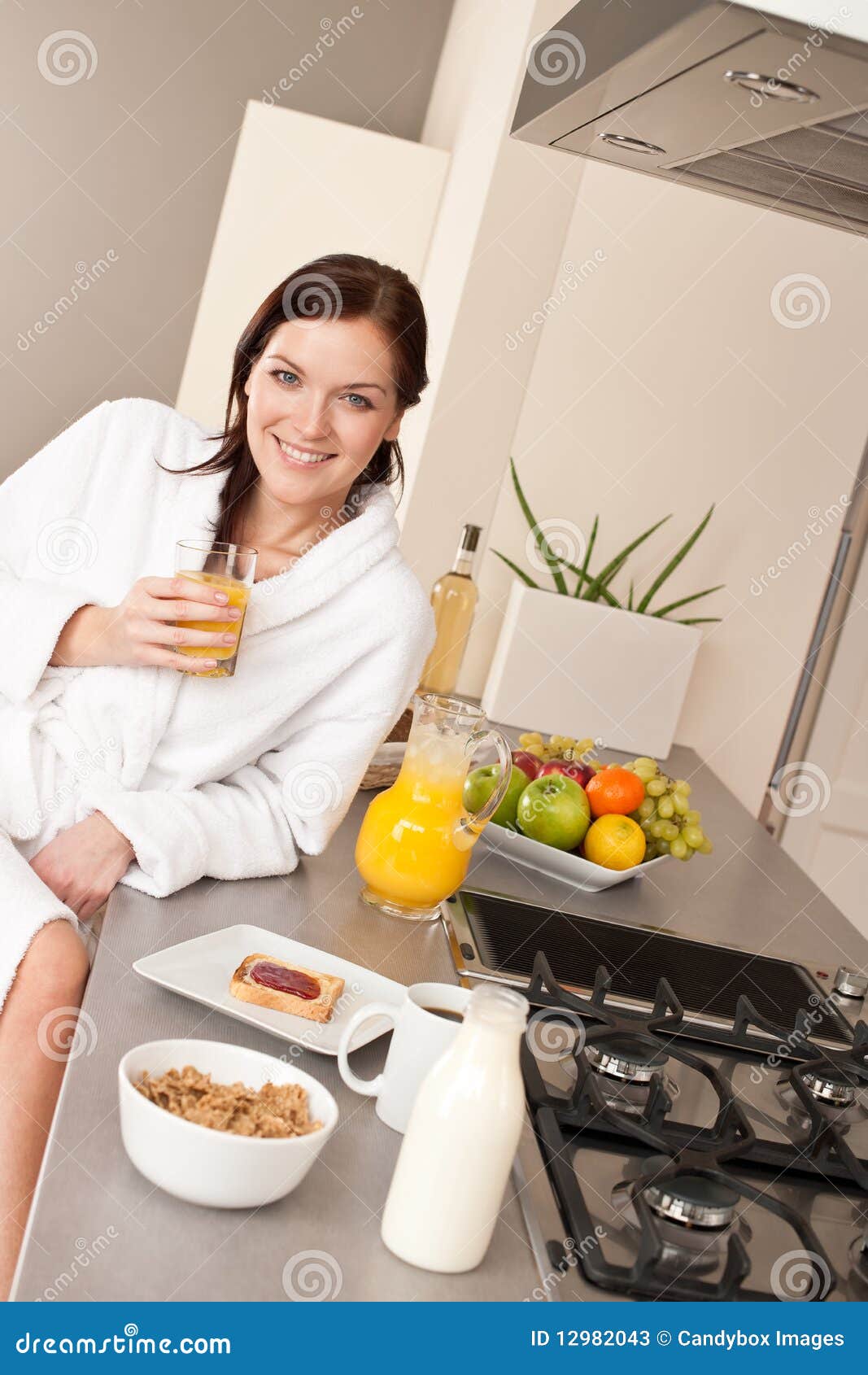 Young Woman Having Breakfast in Modern Kitchen Stock Image - Image of ...