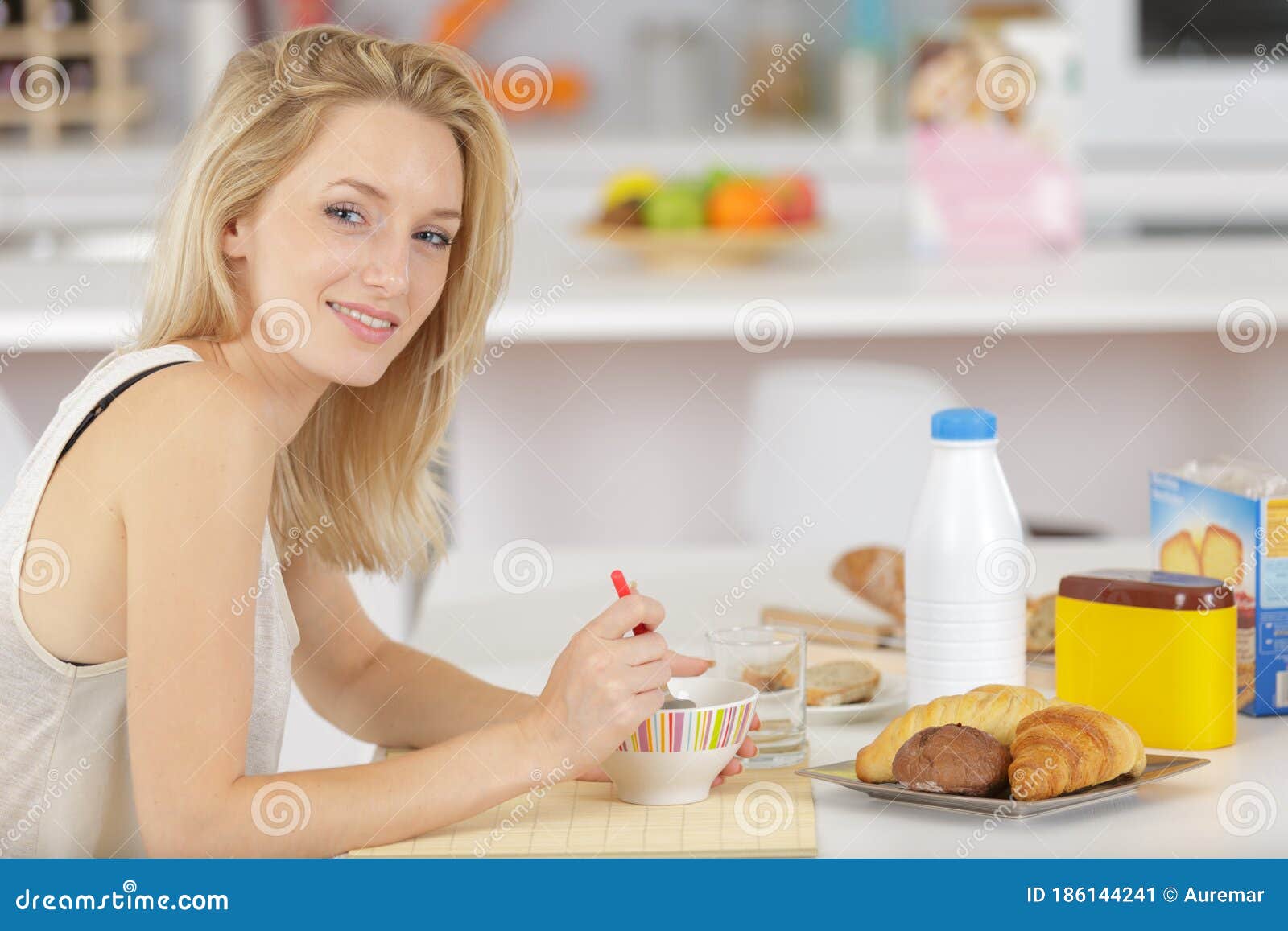 Young Woman Having Breakfast in Morning Stock Image - Image of ...