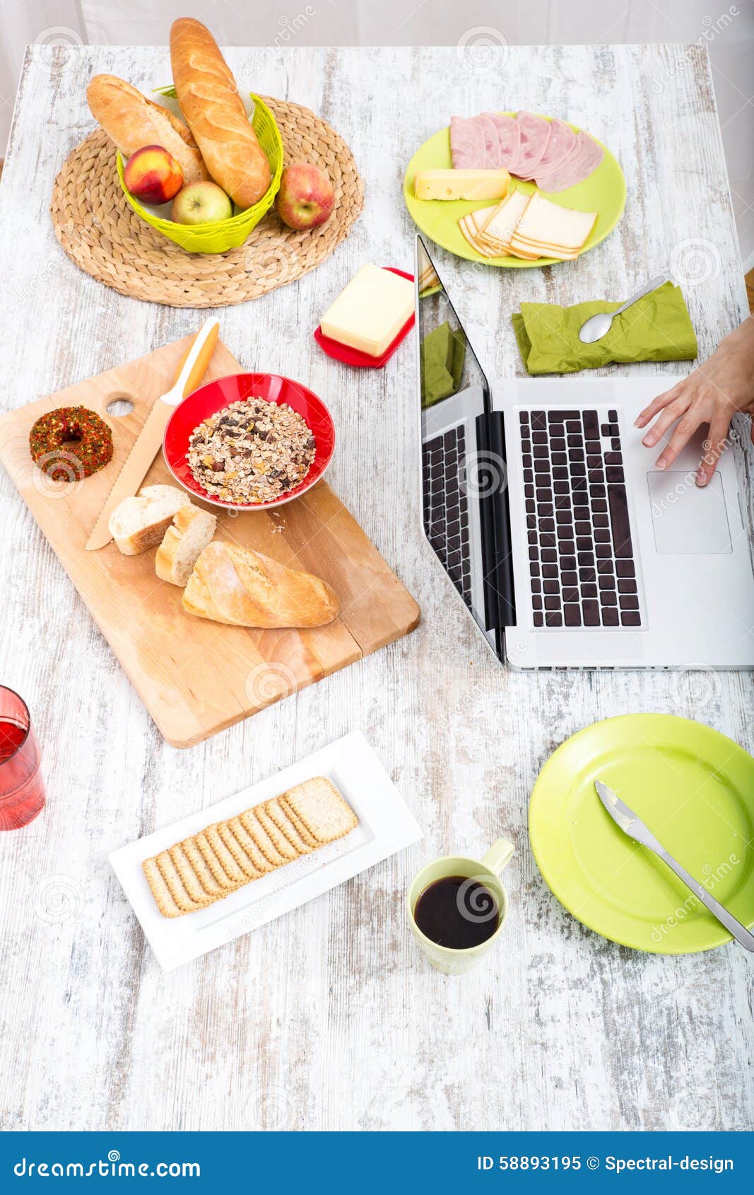 Young Woman Having Breakfast while Using a Laptop Computer Stock Image ...