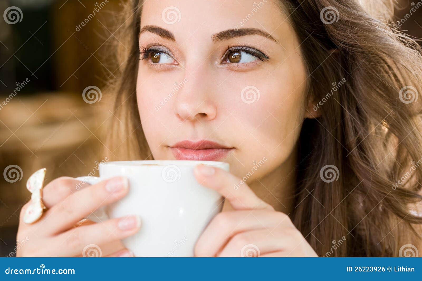 Young woman having coffee. stock photo. Image of attractive - 26223926