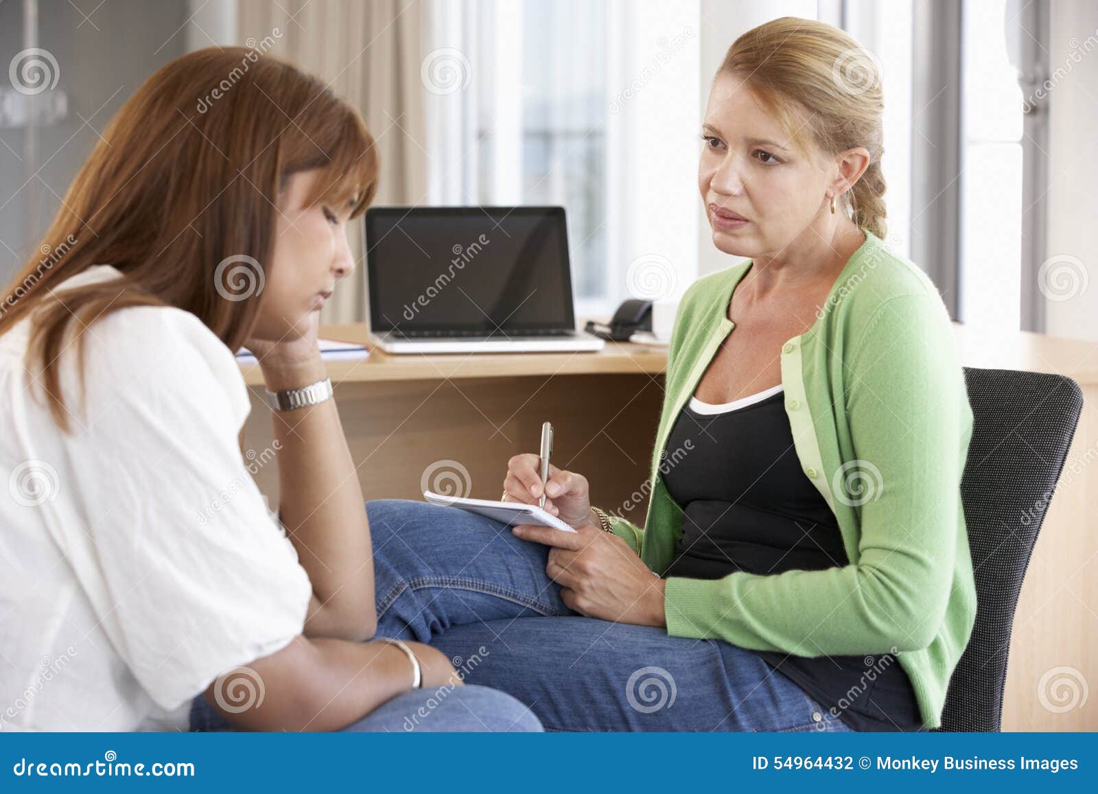 Young Woman Having Counselling Session Stock Photo - Image of listening ...