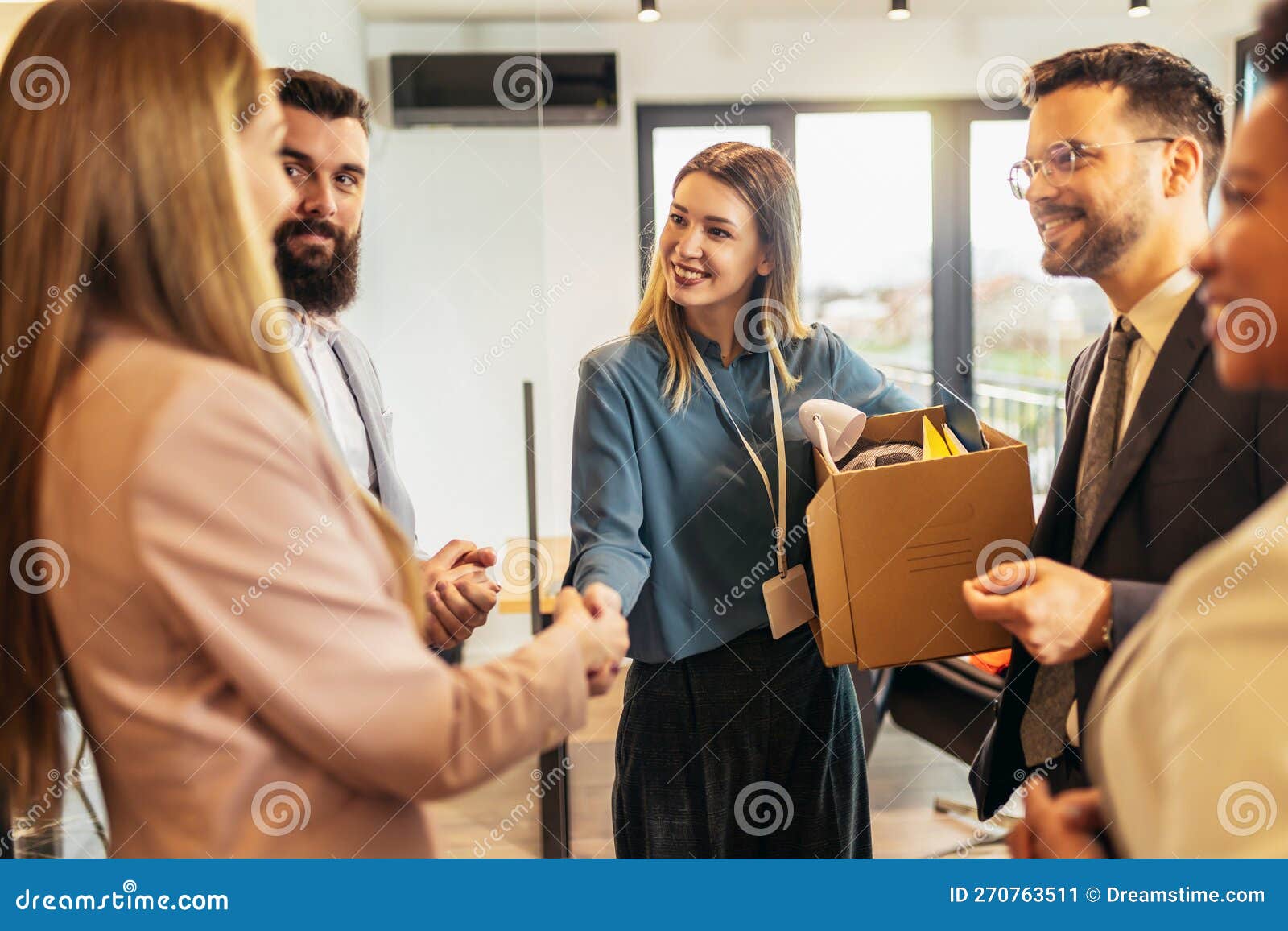 Woman Having First Working Day Getting Acquainted with Colleagues Stock ...