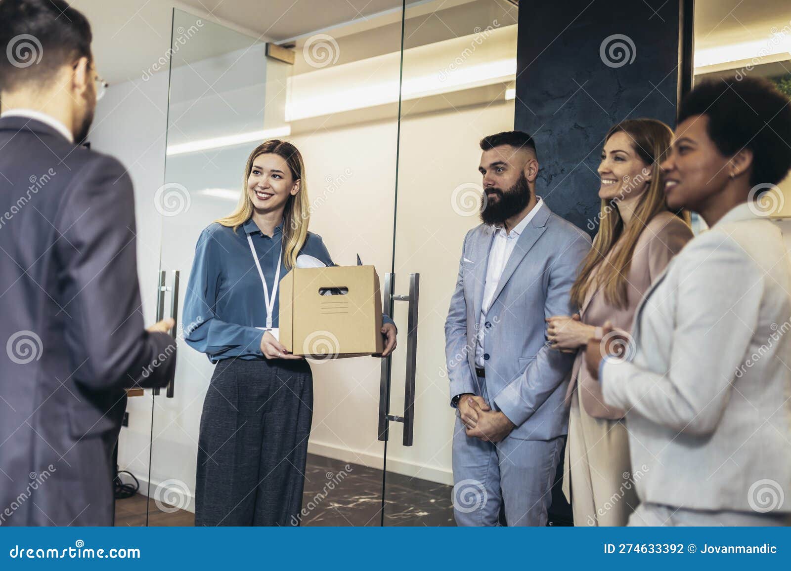 Woman Having First Working Day Getting Acquainted with Colleagues Stock ...