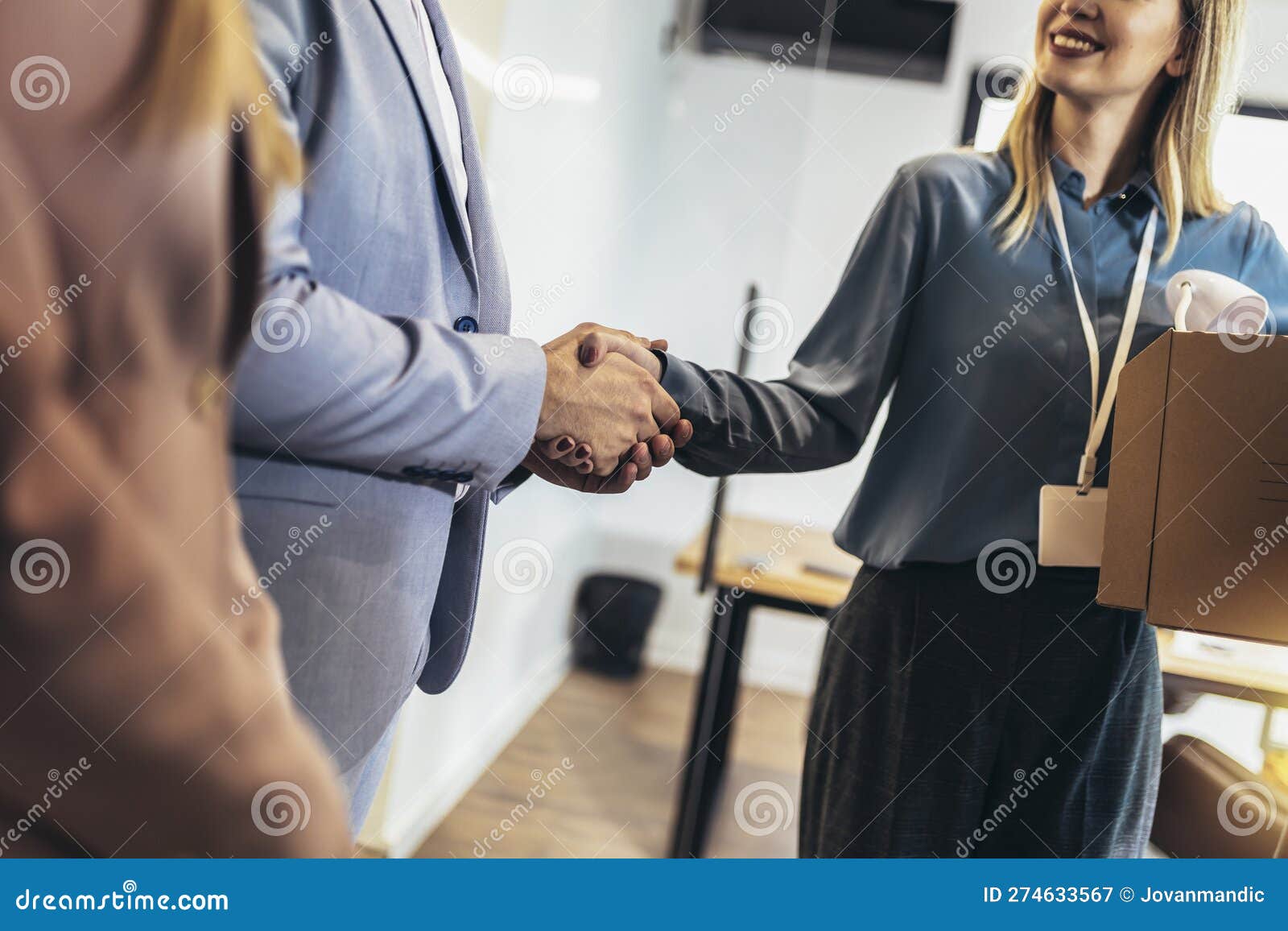 Woman Having First Working Day Getting Acquainted with Colleagues Stock ...