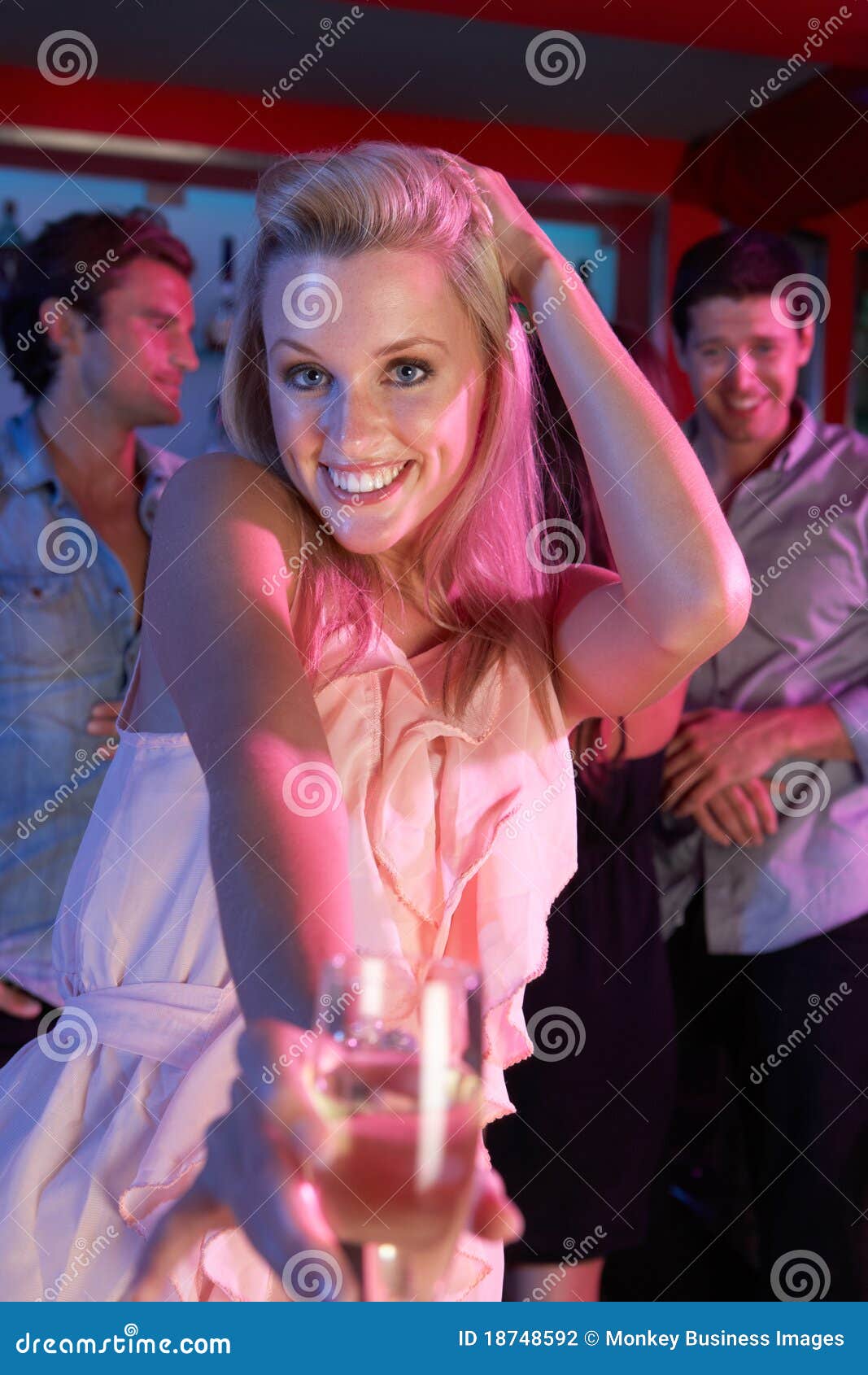 Young Woman Having Fun in Busy Bar Stock Photo - Image of blonde ...