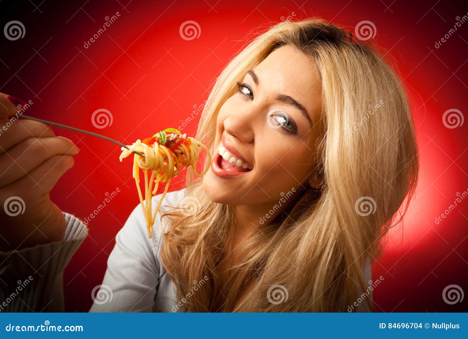 Young Woman Having Spaghetti Stock Photo - Image of taste, indoors ...