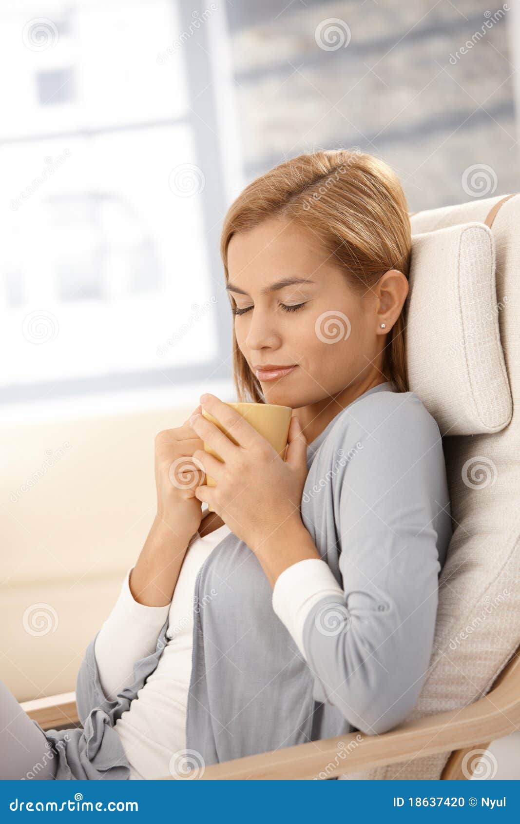 Young Woman Having Tea in Armchair Stock Photo - Image of alone ...