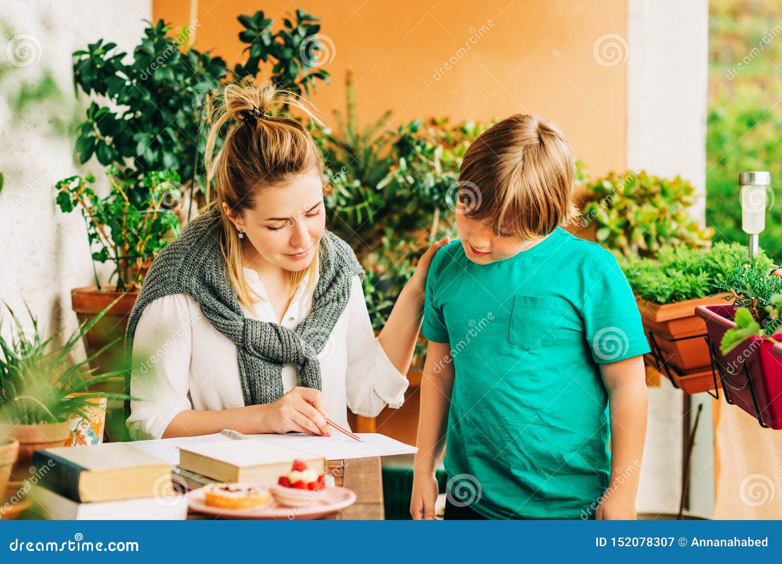 Young Woman Helping Little Boy Stock Image - Image of modern, leisure ...
