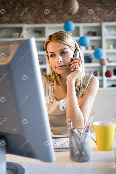 A Young Woman at Her Computer Stock Photo - Image of happiness, face ...