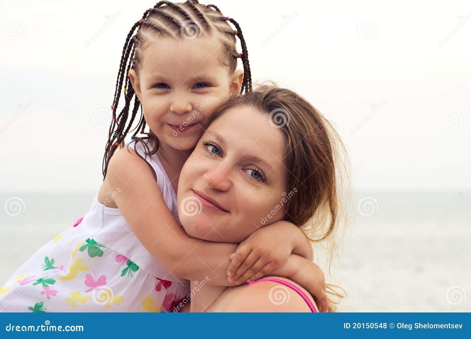 Young Woman and Her Daughter Stock Photo - Image of beautiful, girl ...