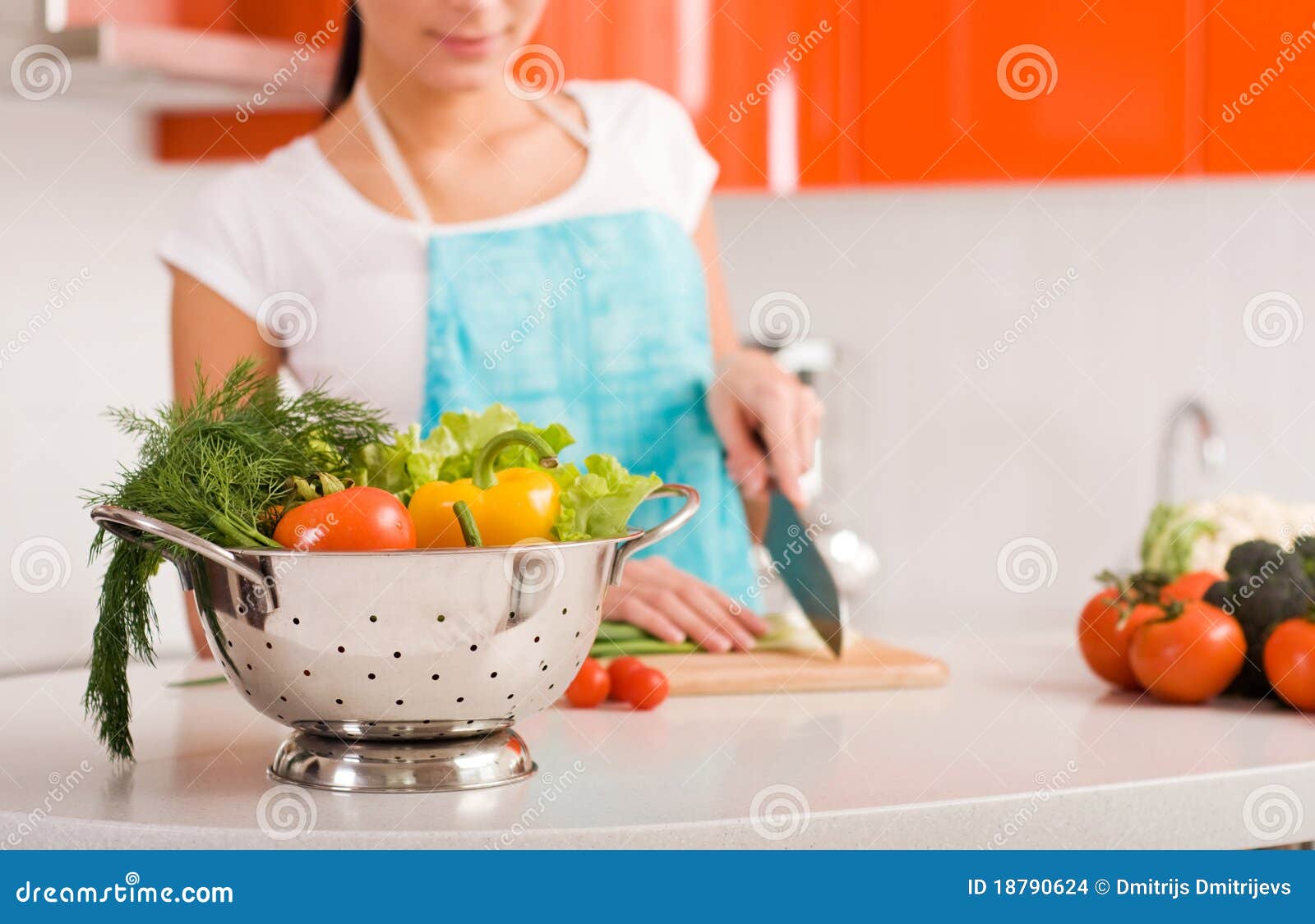 Young Woman in Her Kitchen Cutting Ingredients Stock Photo - Image of ...