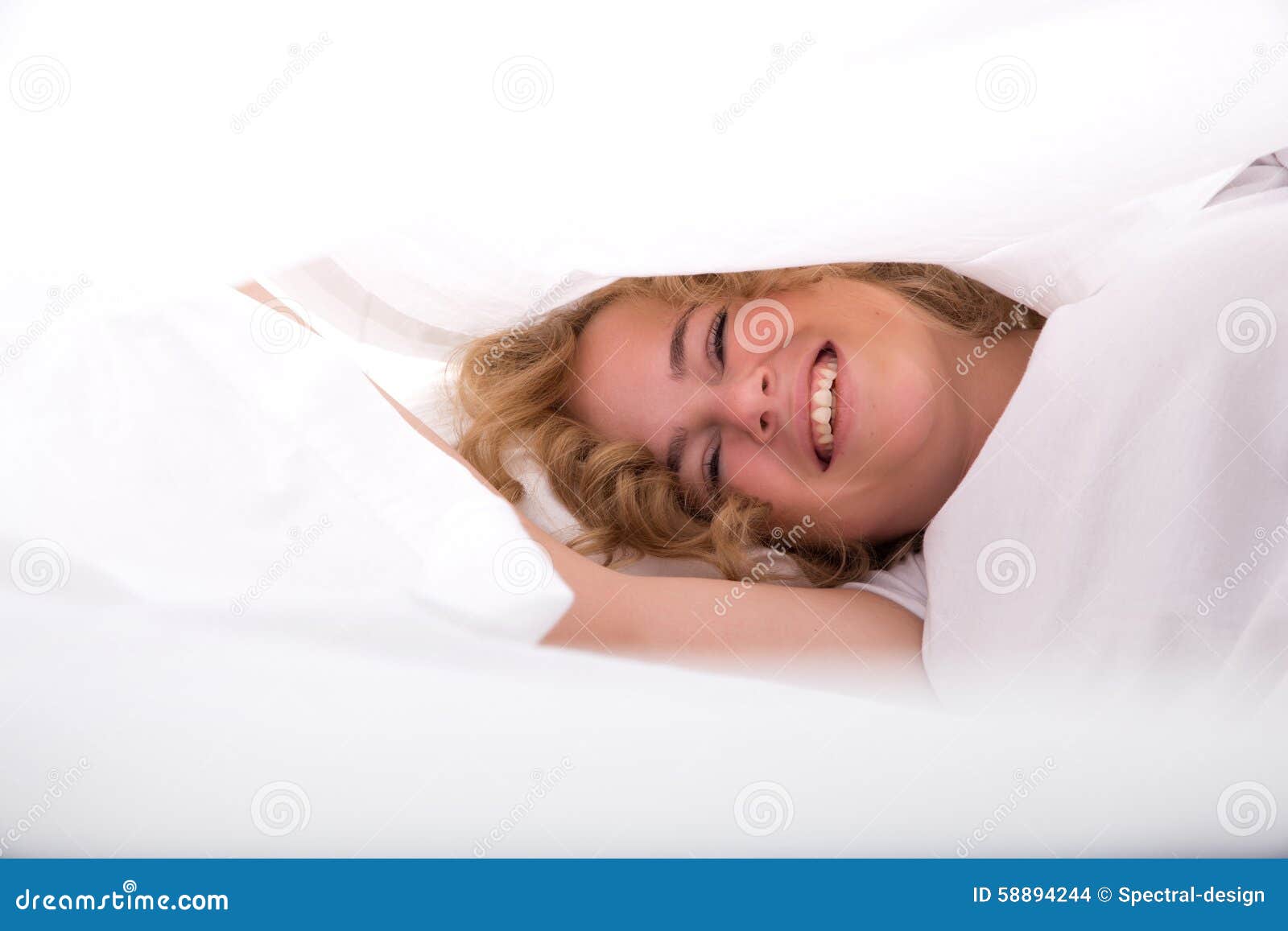 Young Woman Hiding in Bed Under the Sheets Stock Photo - Image of ...