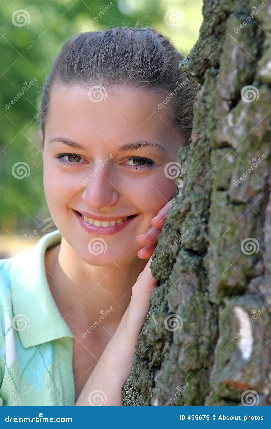 Young Woman Hiding by the Tree Stock Image - Image of pose, bashful: 495675