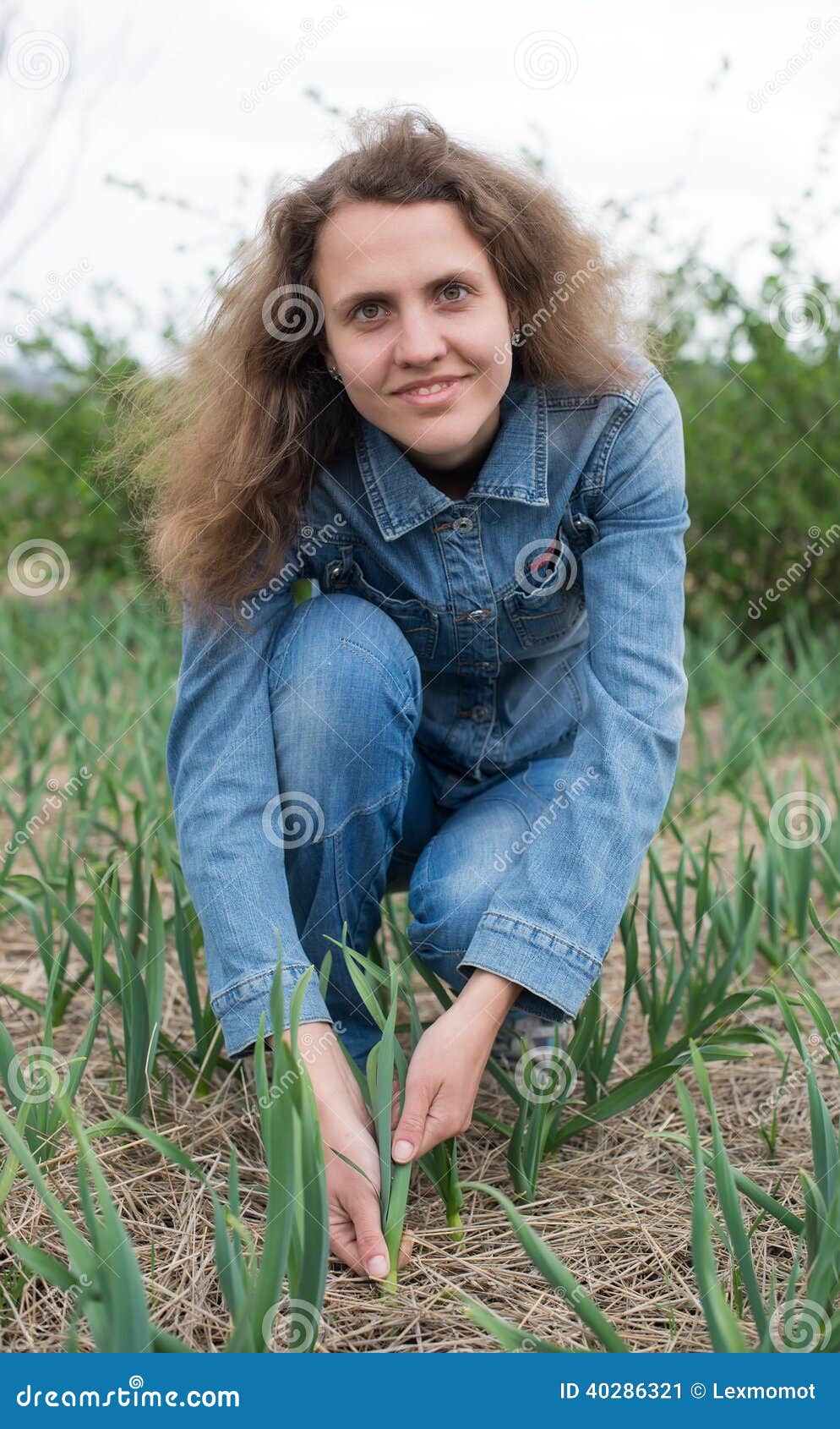 Young Woman with Hoe Working Stock Image - Image of activity, hair ...