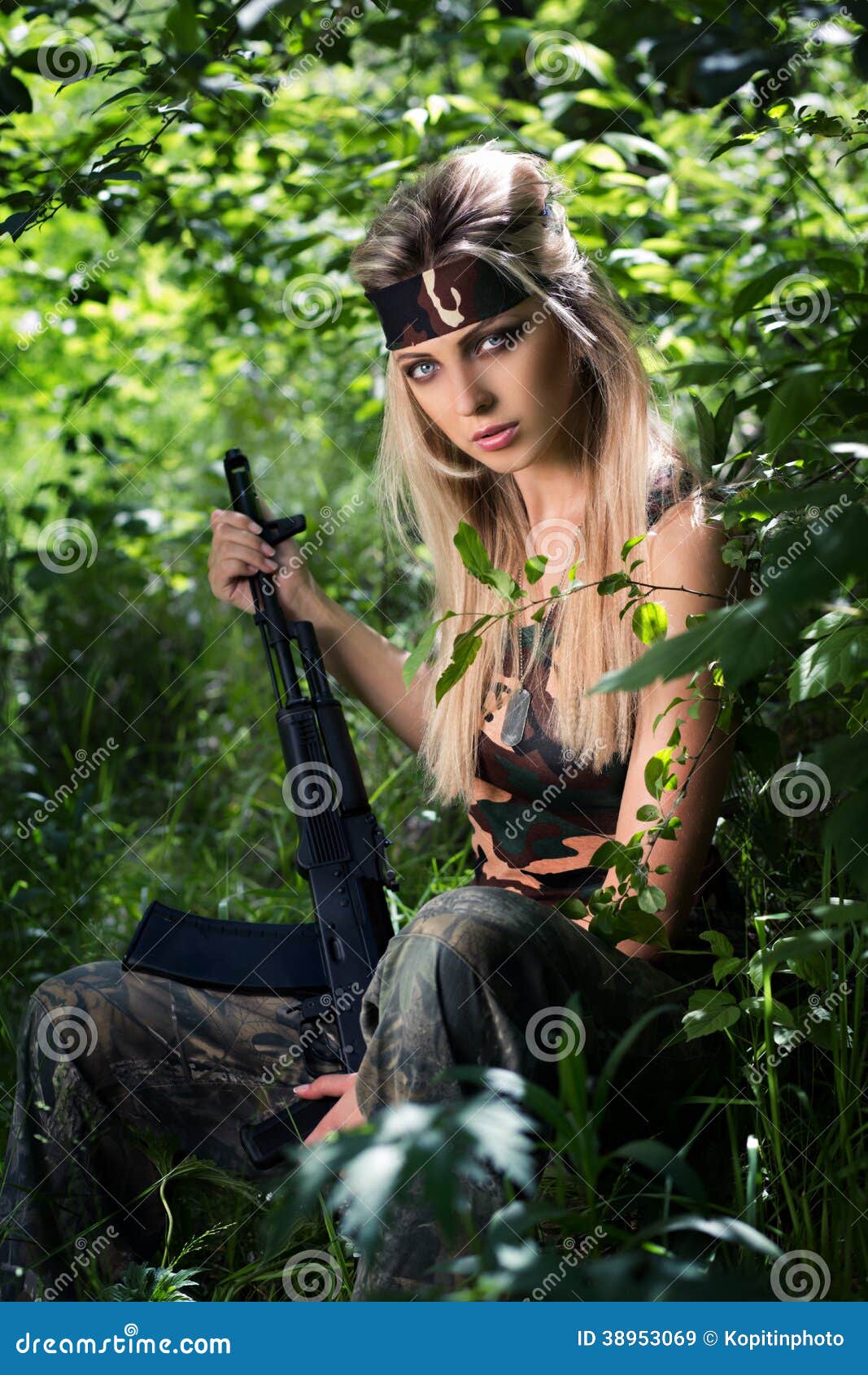 Young Woman Holding an Automatic Assault Rifle Stock Image - Image of ...