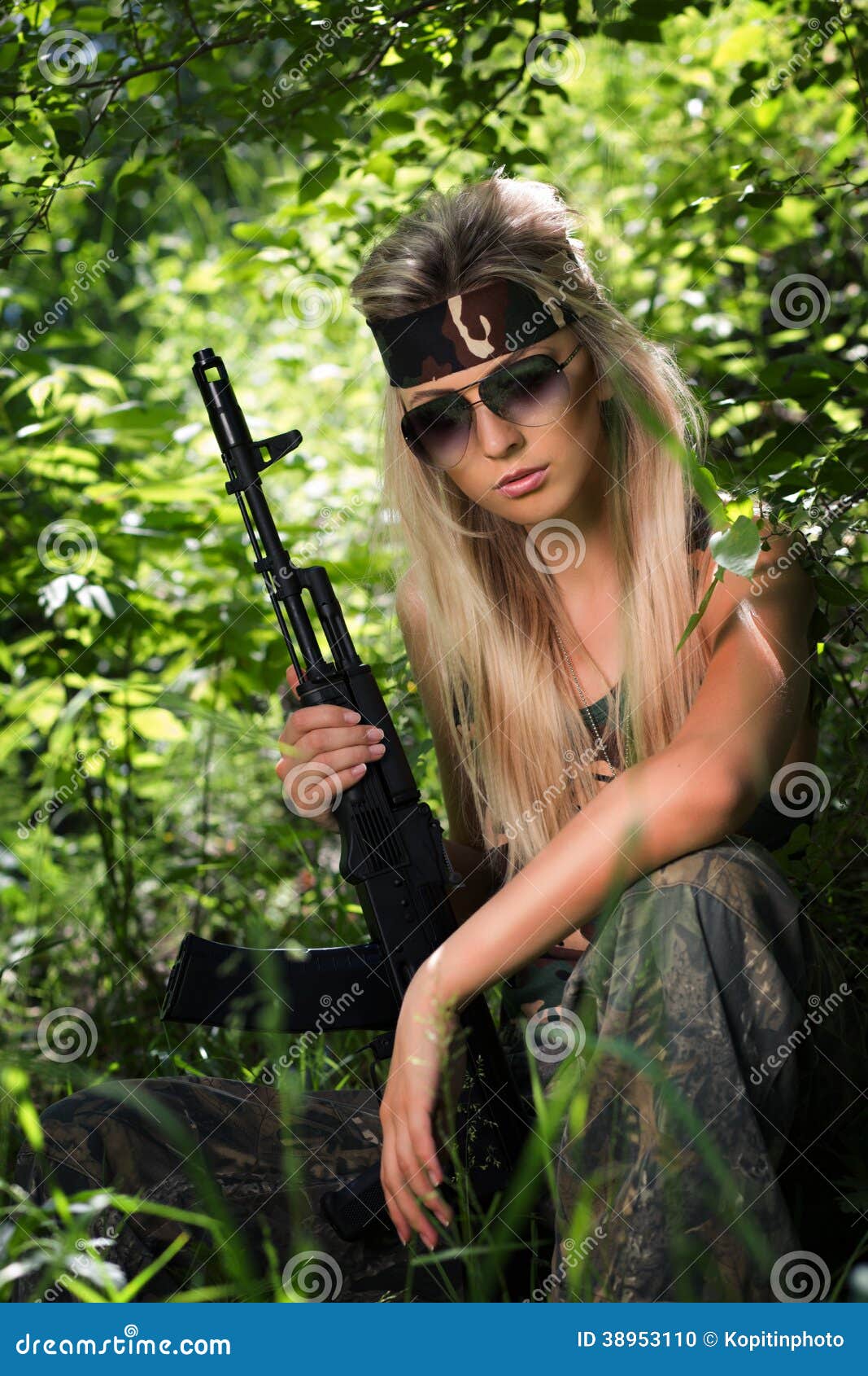 Young Woman Holding an Automatic Assault Rifle Stock Photo - Image of ...
