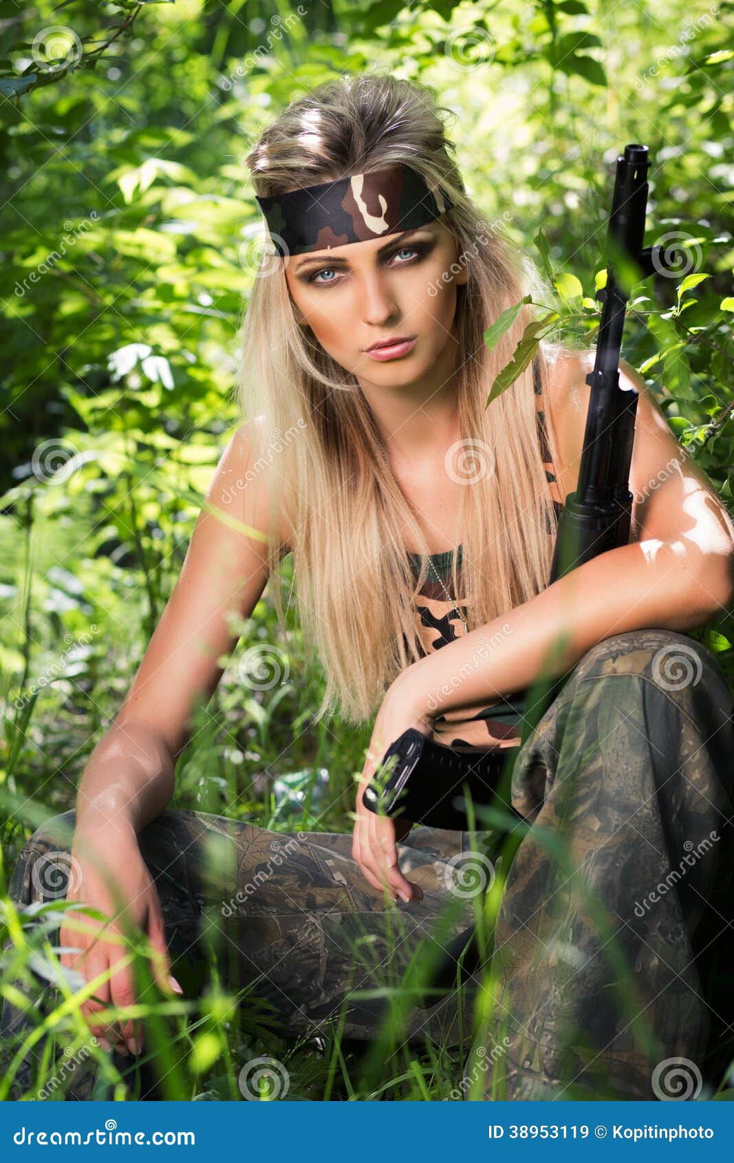 Young Woman Holding an Automatic Assault Rifle Stock Image - Image of ...