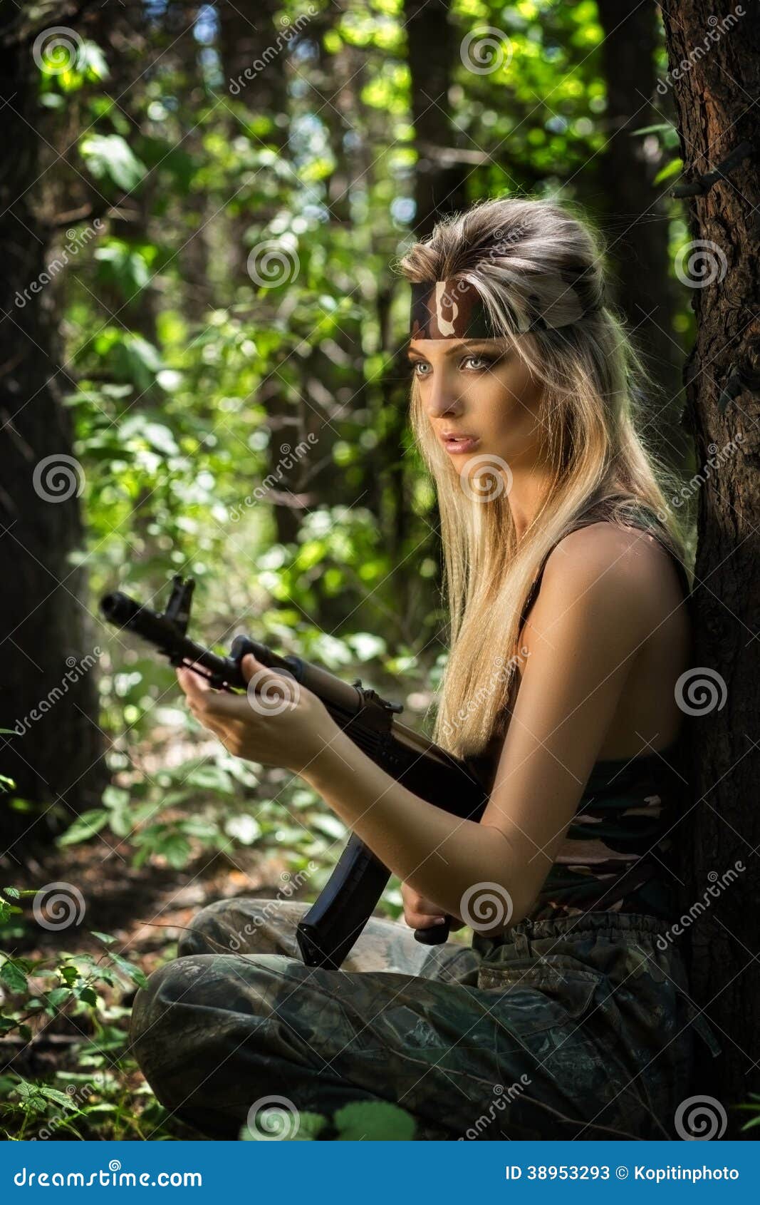 Young Woman Holding an Automatic Assault Rifle Stock Image - Image of ...
