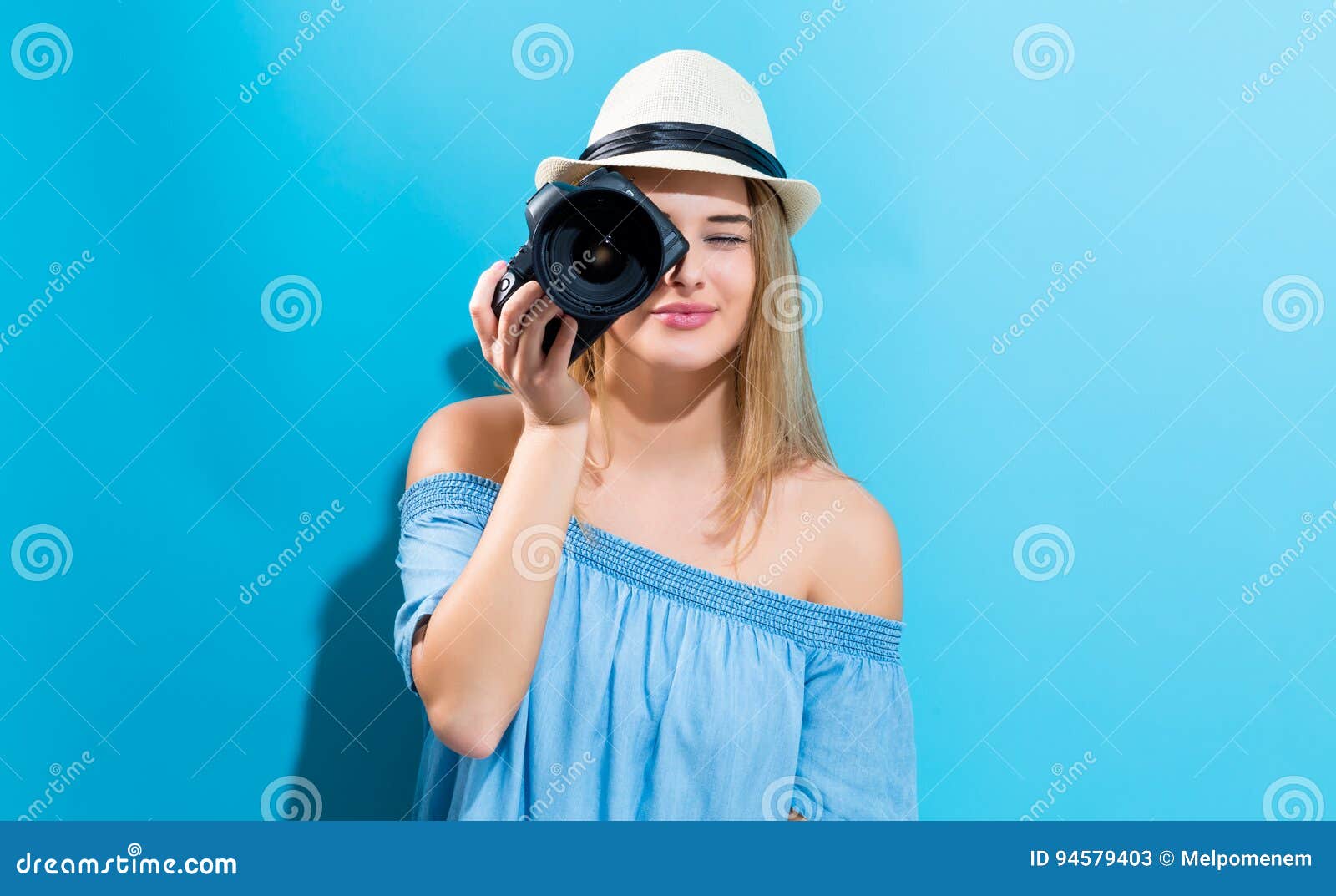 Young Woman Holding a Camera Stock Image - Image of cheerful, vivid ...