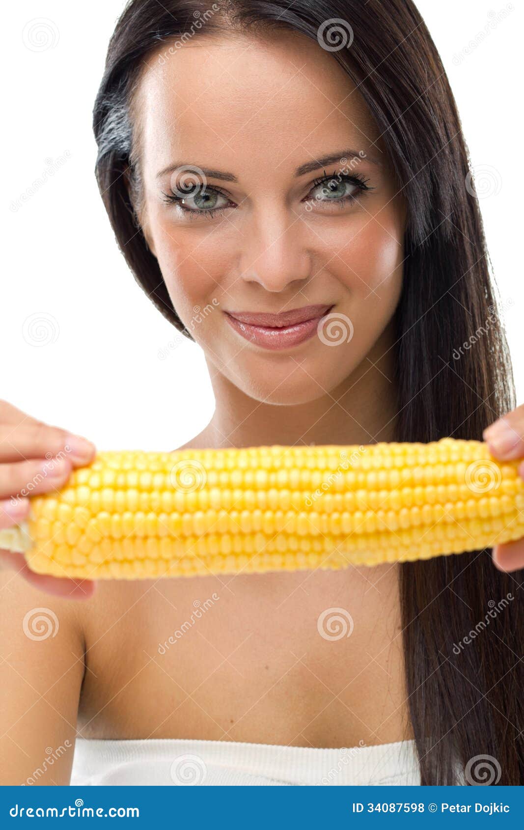 Young woman holding a corn stock photo. Image of idea - 34087598