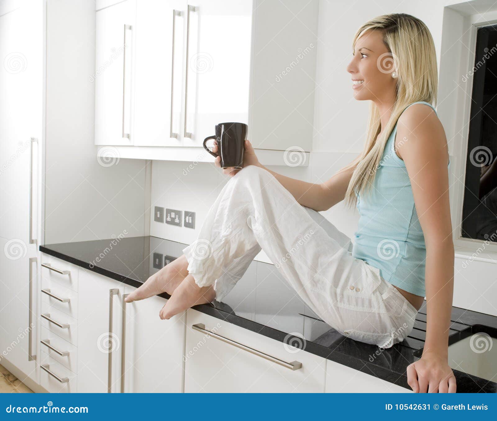 Young woman holding cup stock image. Image of smiling - 10542631