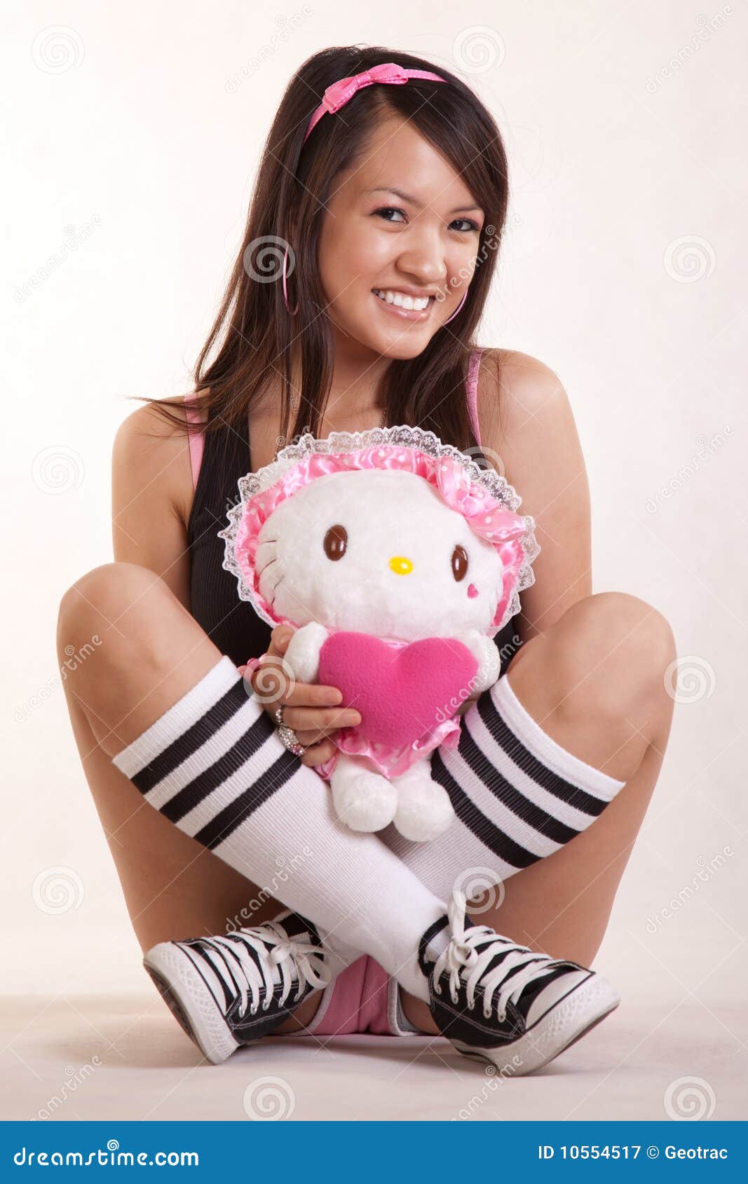 Young woman holding doll stock image. Image of white - 10554517 Young woman holding doll stock image. Image of white - 10554517