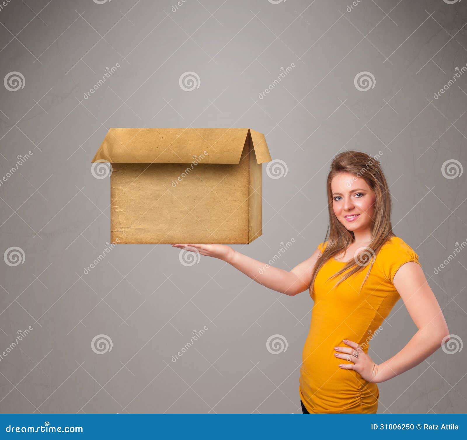 Young Woman Holding an Empty Cardboard Box Stock Photo - Image of ...