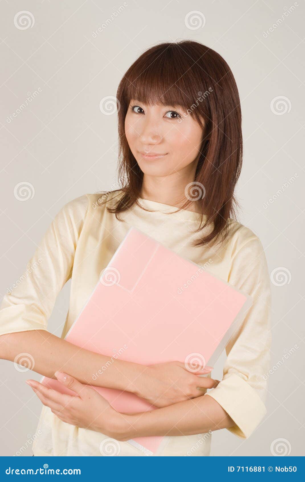 Young woman holding file stock image. Image of business - 7116881
