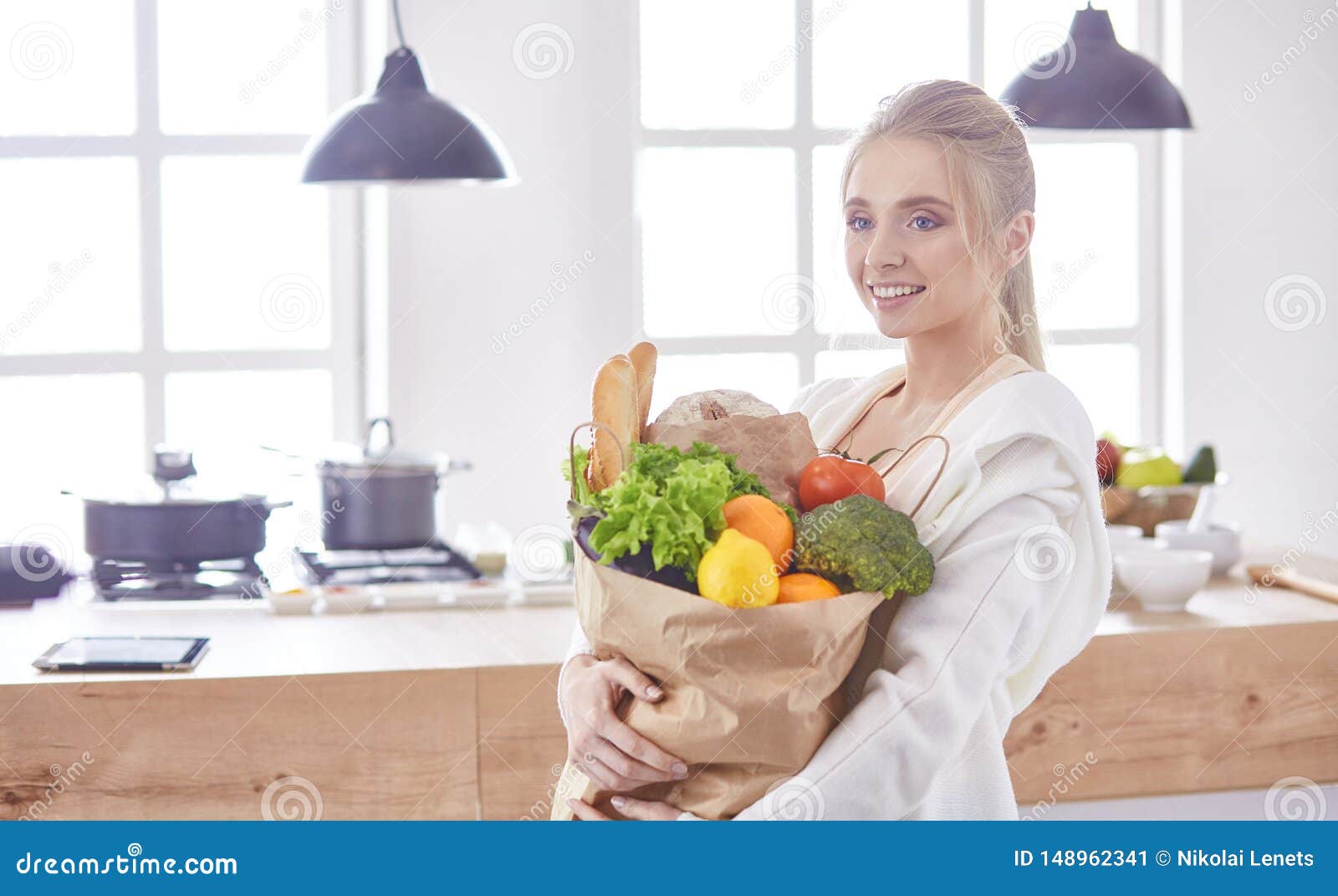 Young Woman Holding Grocery Shopping Bag with Vegetables Standi Stock ... Young Woman Holding Grocery Shopping Bag with Vegetables Standi Stock ...