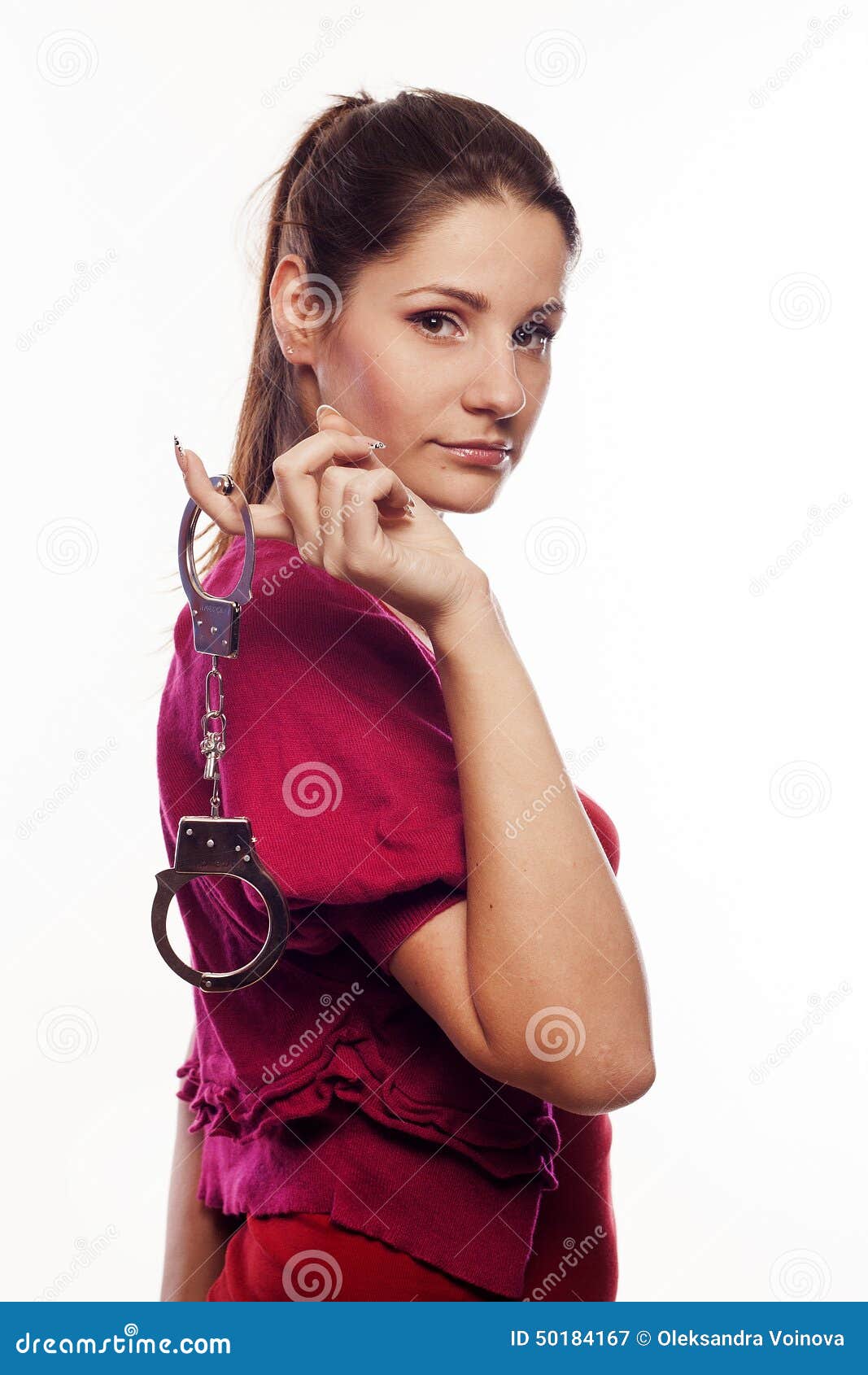 Young Woman Holding Handcuffs Stock Image - Image of handcuff, female ... Young Woman Holding Handcuffs Stock Image - Image of handcuff, female ...