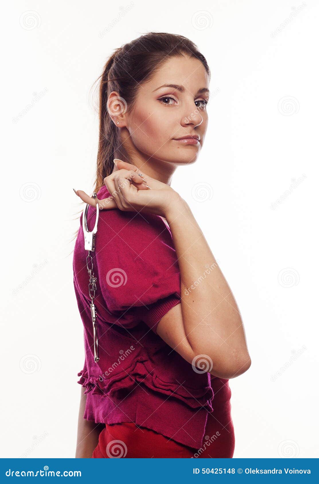 Young Woman Holding Handcuffs Stock Photo - Image of female, adult ...