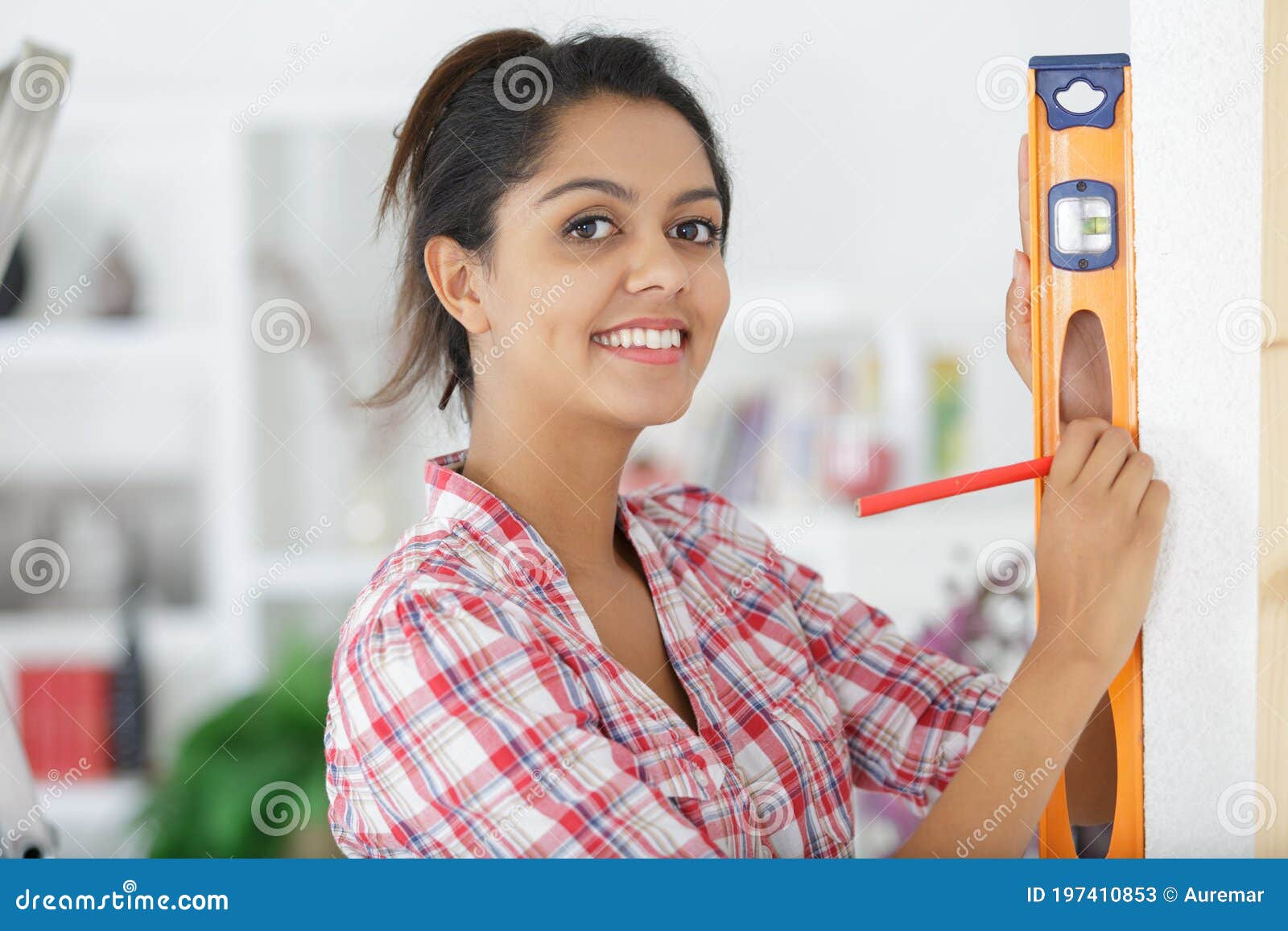 Young Woman Holding in Hands Level Measuring Device Stock Image - Image ...