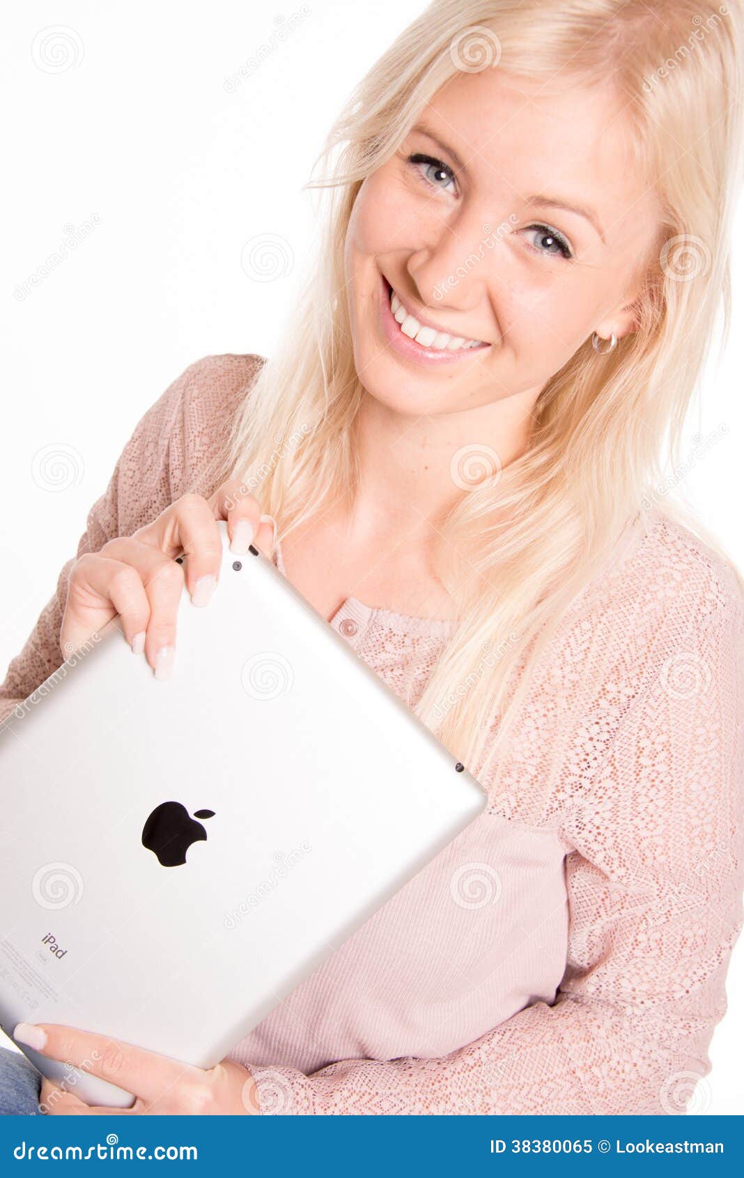 Young woman holding iPad editorial image. Image of toothy - 38380065
