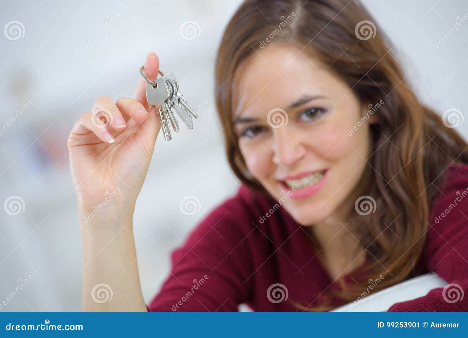 Young woman holding keys stock image. Image of home, building - 99253901