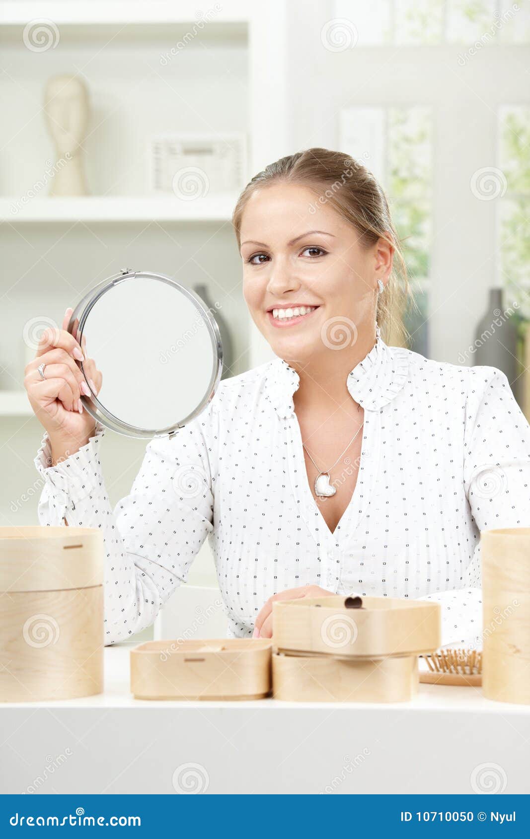 Young woman holding mirror stock photo. Image of beautiful - 10710050