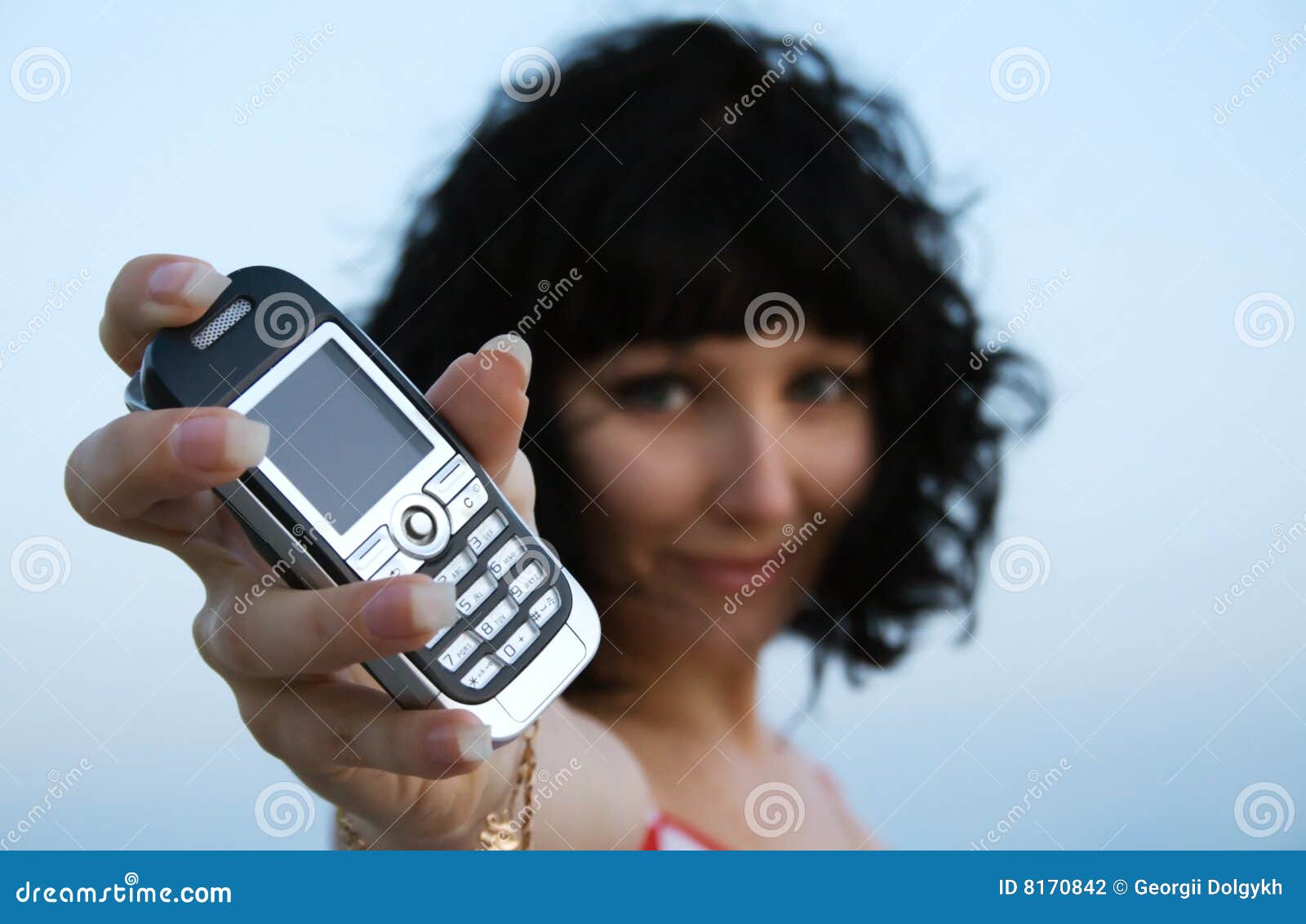 Young Woman Holding a Mobile Phone Stock Photo - Image of human, mobile ...
