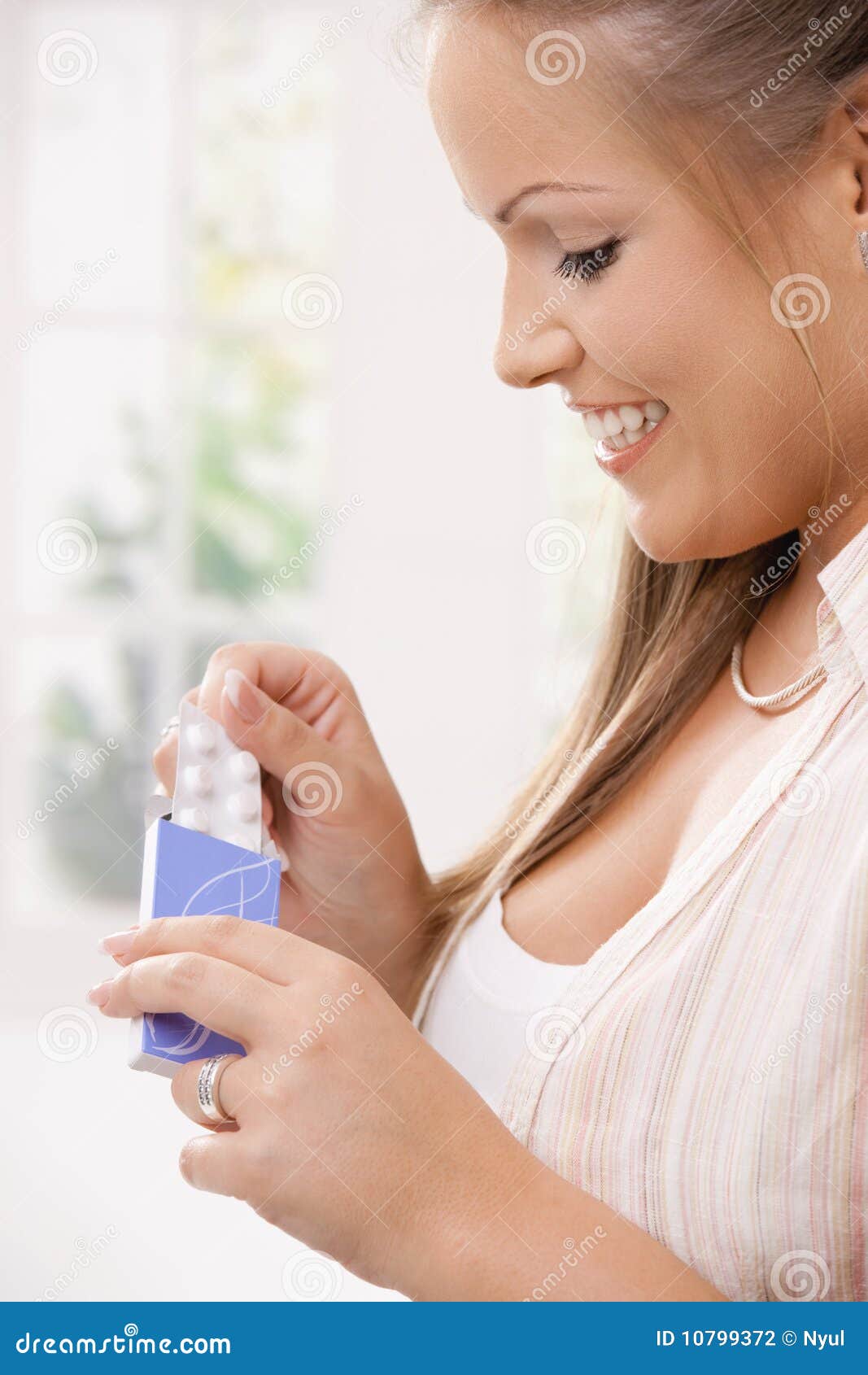 Young Woman Holding Package of Drugs Stock Photo - Image of expression ...