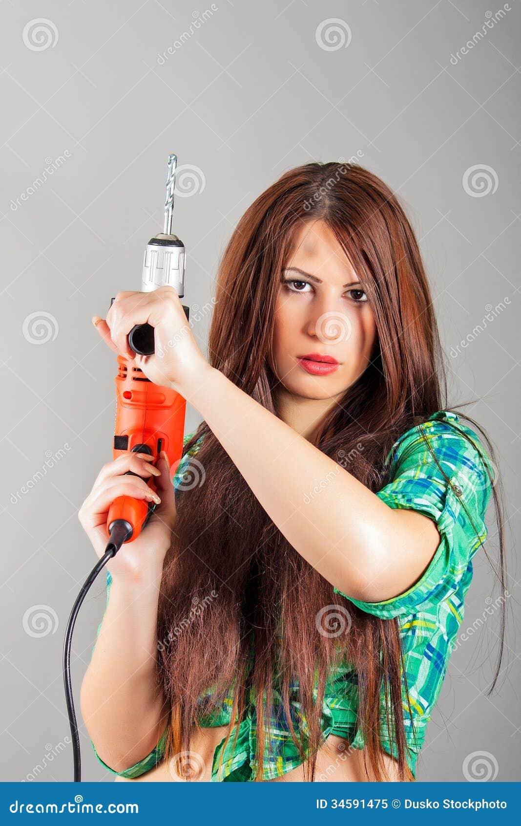 Young Woman Holding a Power Tool Stock Image - Image of adult ...