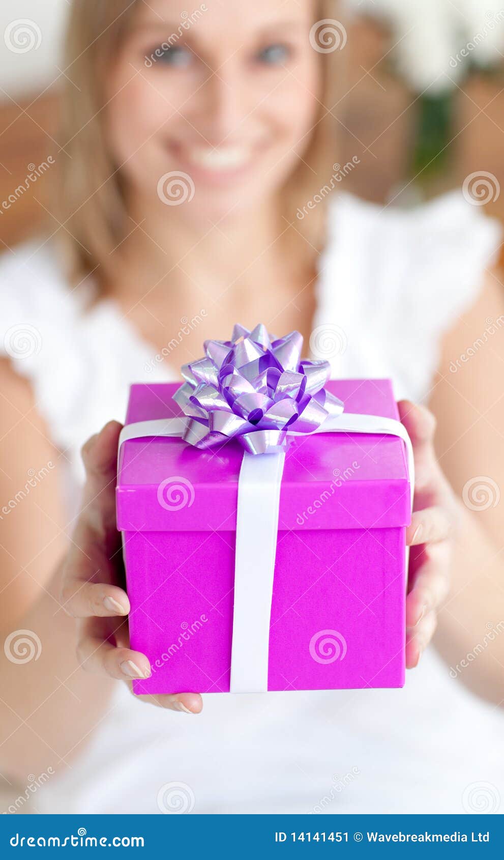 Young Woman Holding a Present Sitting on the Floor Stock Image - Image ...