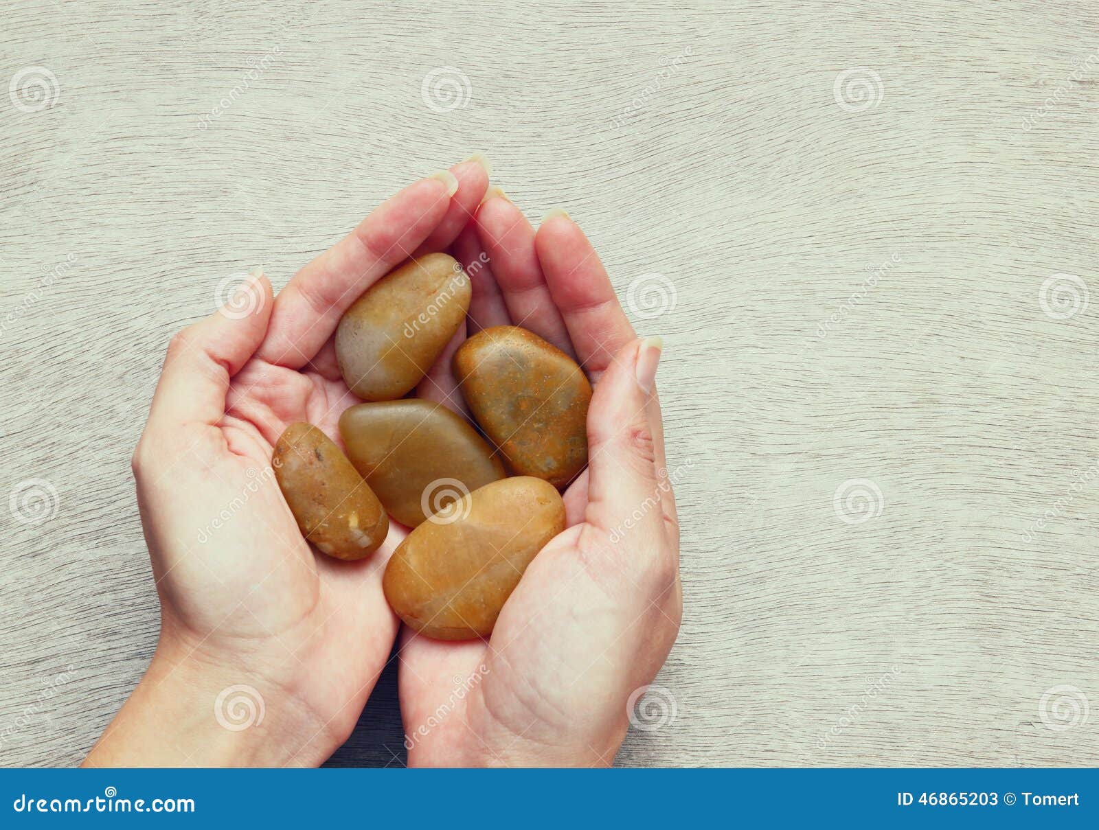 Young Woman Holding River Stones Stock Image - Image of girl, concept ...