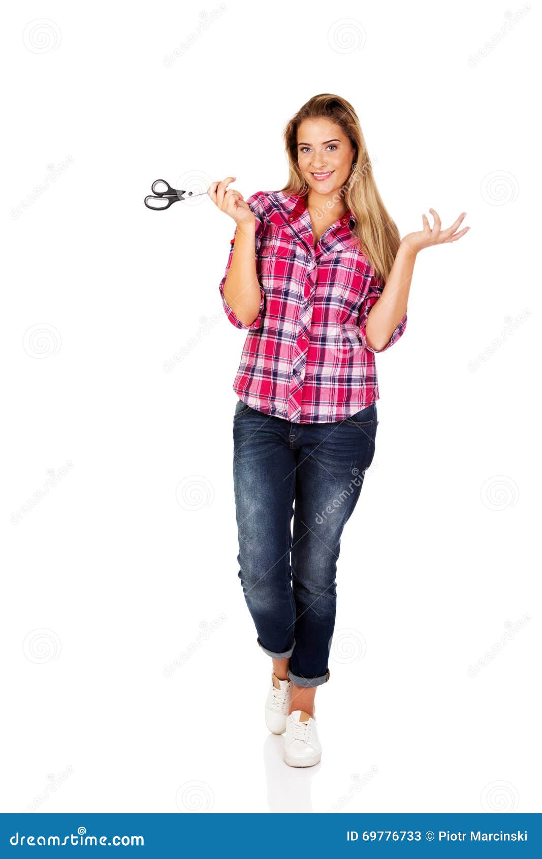 Young Woman Holding Scissors and Gesturing Dont Know Stock Image ...