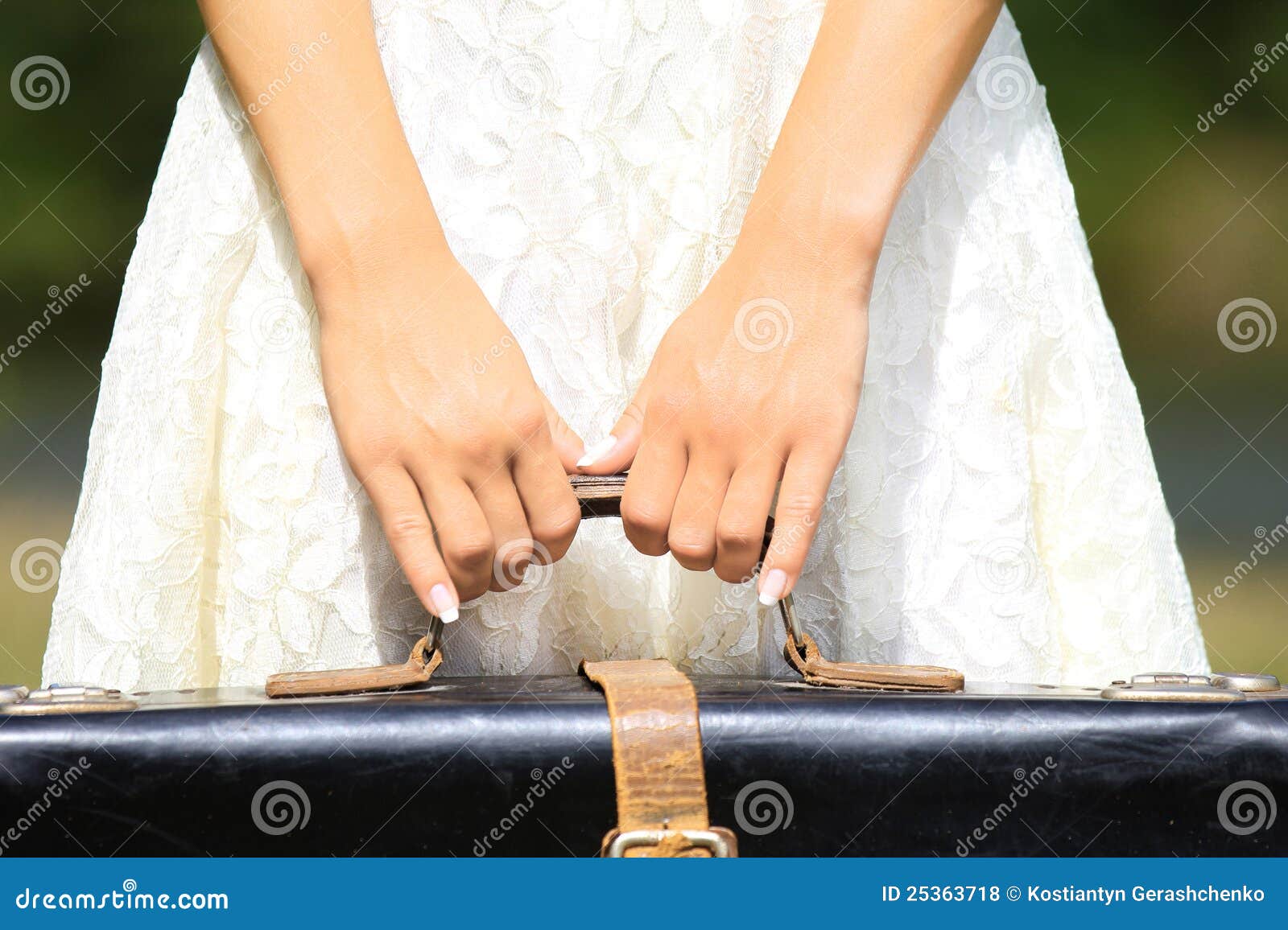 A Young Woman Holding a Suitcase Stock Photo - Image of standing, happy ...