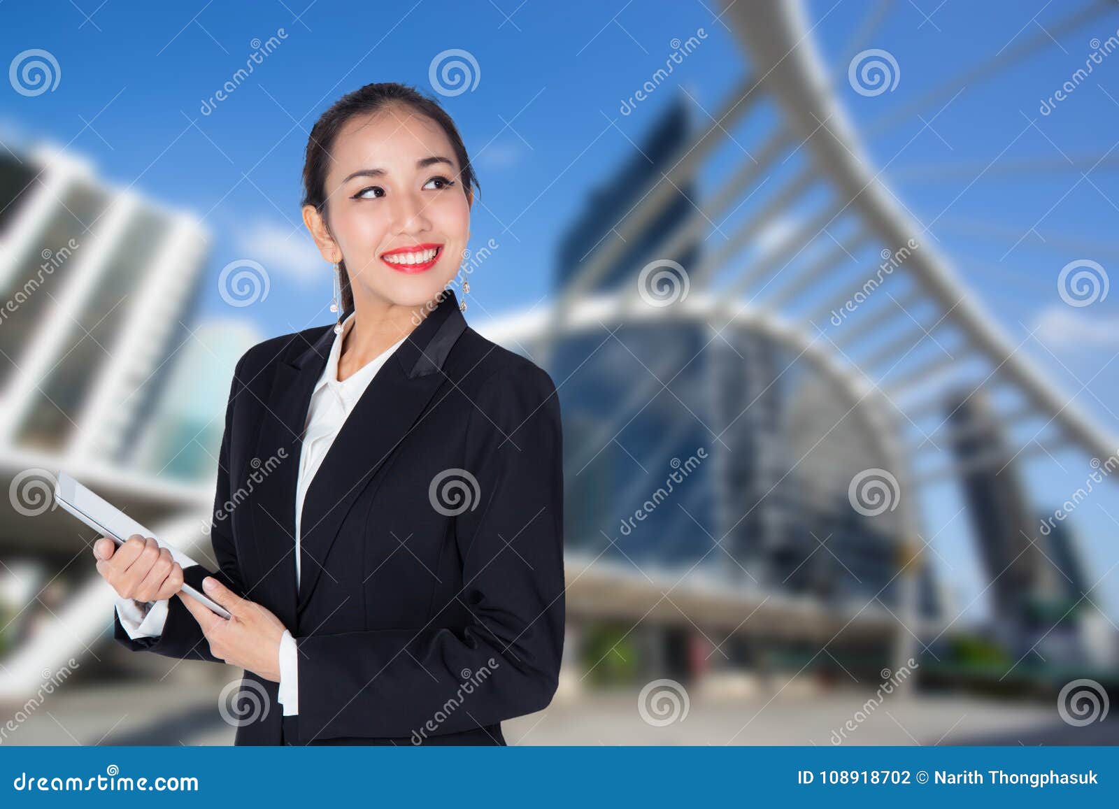 Young Woman Holding Using Touch Pad Tablet Computer, Model is a Asian ...
